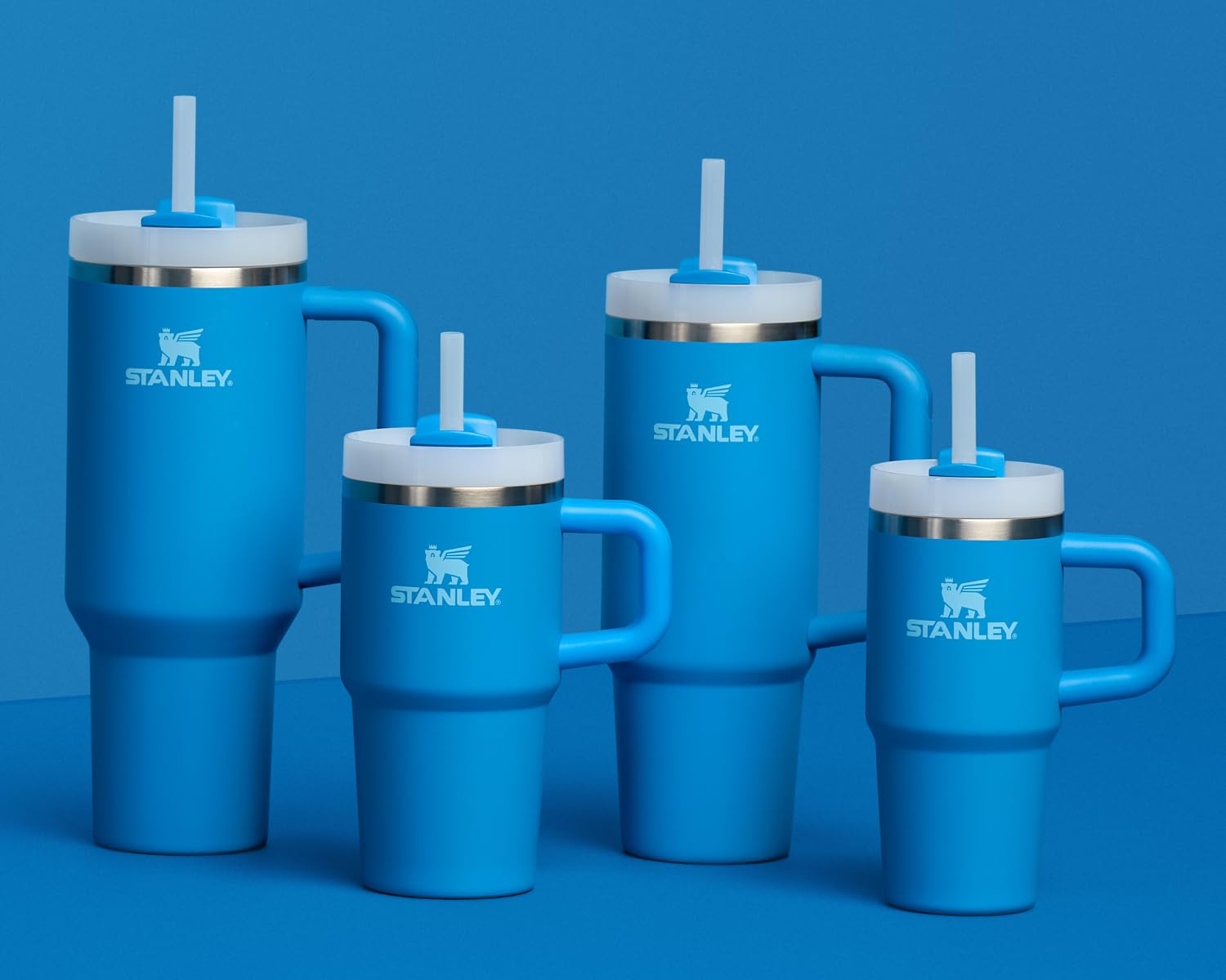 Stanley Quencher H2.0 Tumbler with Handle and Straw 20 oz | Flowstate 3-Position Lid | Cup Holder Compatible for Travel | Insulated Stainless Steel Cup | BPA-Free | Azure
