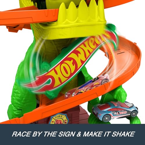 Hot Wheels Toy Car Track Set, City T-Rex Blaze Battle Playset & 1:64 Scale Die-Cast Vehicle, 18β Tall, Multiple Race Outcomes, Spinning Dinosaur Eyes