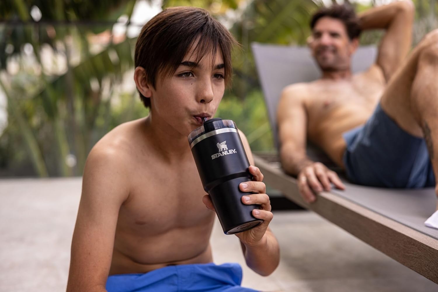 Stanley Quencher H2.0 Tumbler with Straw 20 oz | Flowstate 3-Position Lid | Cup Holder Compatible for Travel | Insulated Stainless Steel Cup | BPA-Free | Black Glow