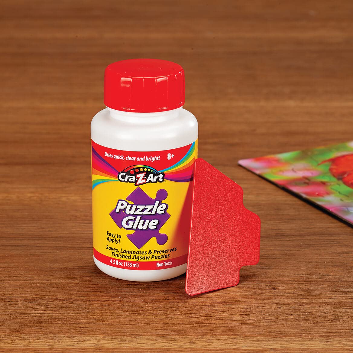 RoseArt Jigsaw Puzzle Glue with Applicator - Saves, Laminates and Preserves Finished Jigsaw Puzzles - Easy to Apply, Dries Quick, Clear & Bright