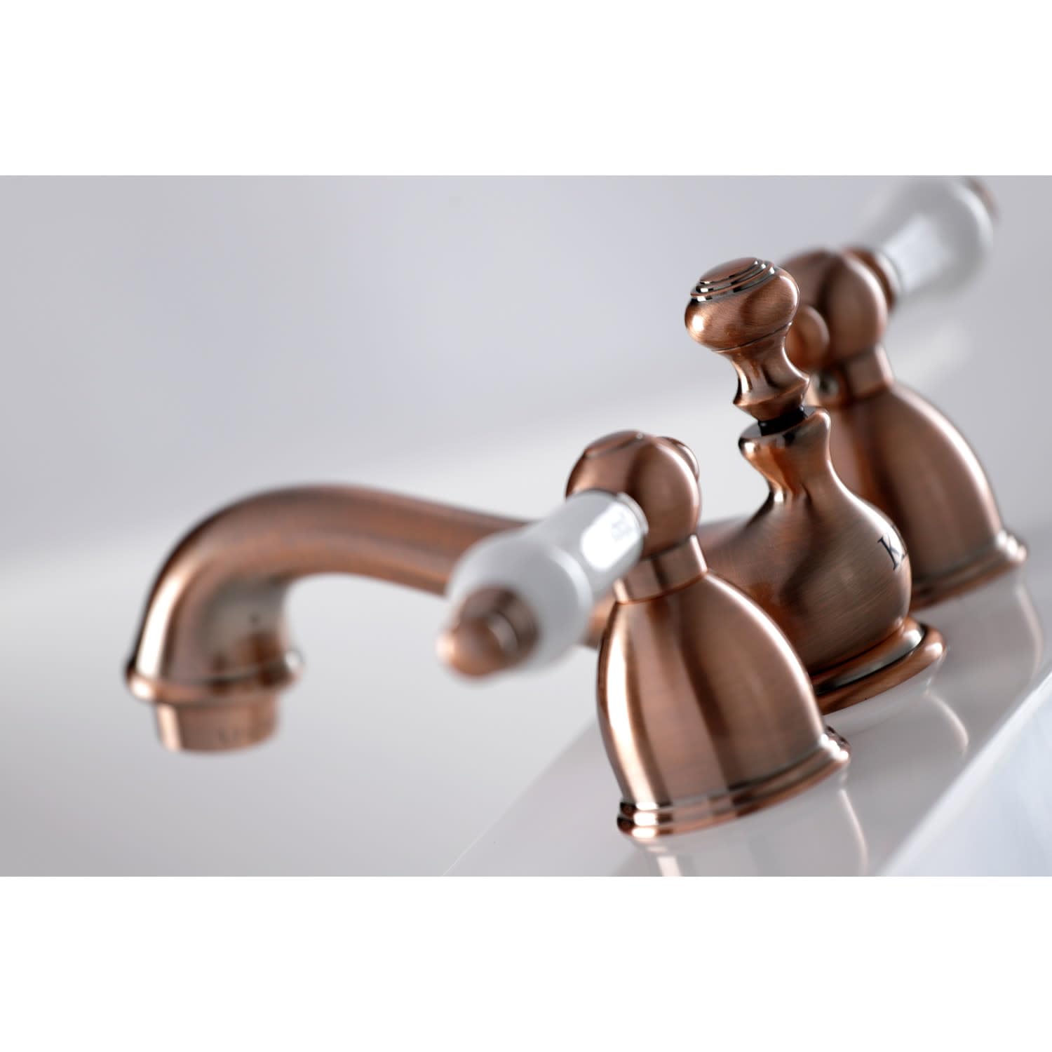 Kingston Brass KS3955PL Restoration Mini Widespread Lavatory Faucet with Porcelain Lever Handle, Oil Rubbed Bronze