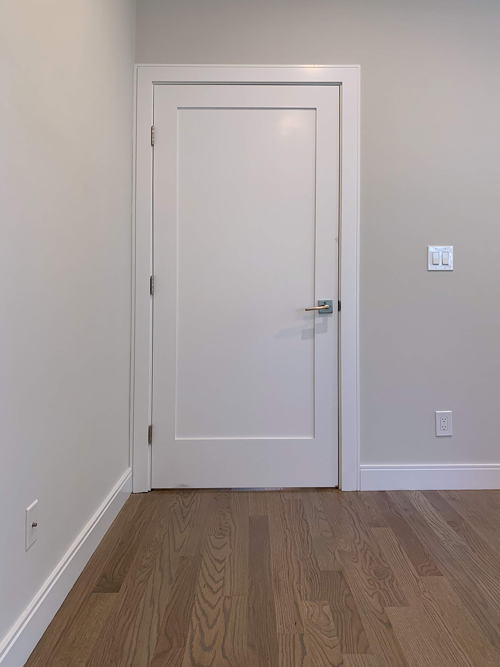 24 in. x 80 in. Right-Handed Solid Core Pre-Hung Interior Door White Primed Smooth Texture Single Panel with Black Hinges