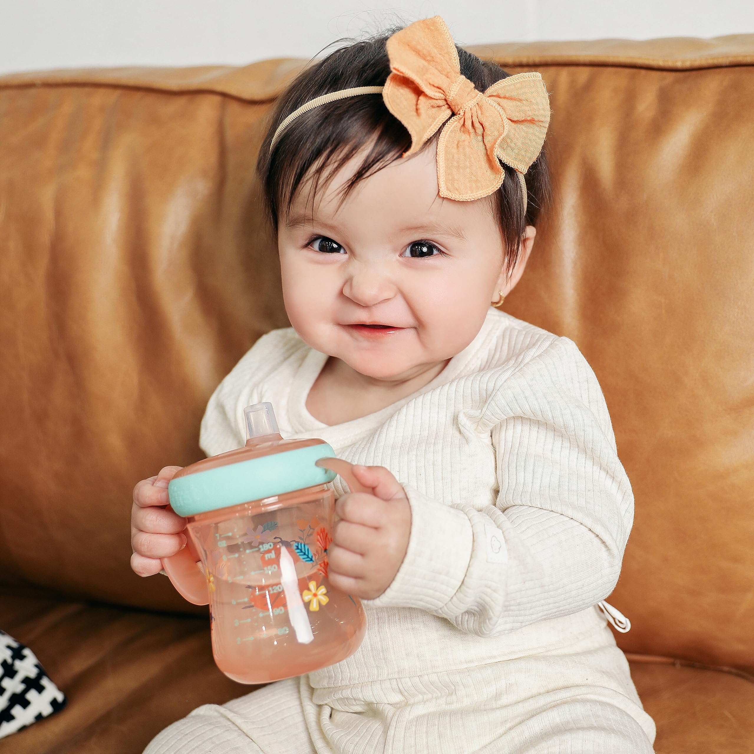 The First Years - Soft Spout Sippy Cup - Toddler Trainer Cup for 6+ Months -with Handles and Leak Proof Lid - 7 Oz - Floral Ladybug Print - 2 Count