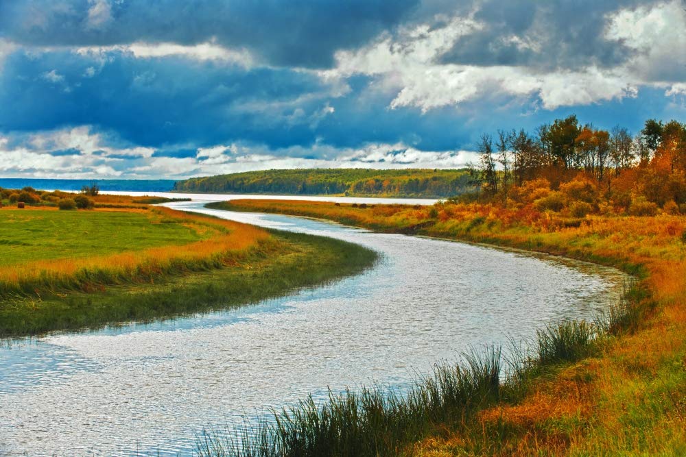 Posterazzi PDDCN11BJY0096LARGE Canada, Saskatchewan, Green Lake. River and Storm Clouds Photo Print, 24 x 36, Multi