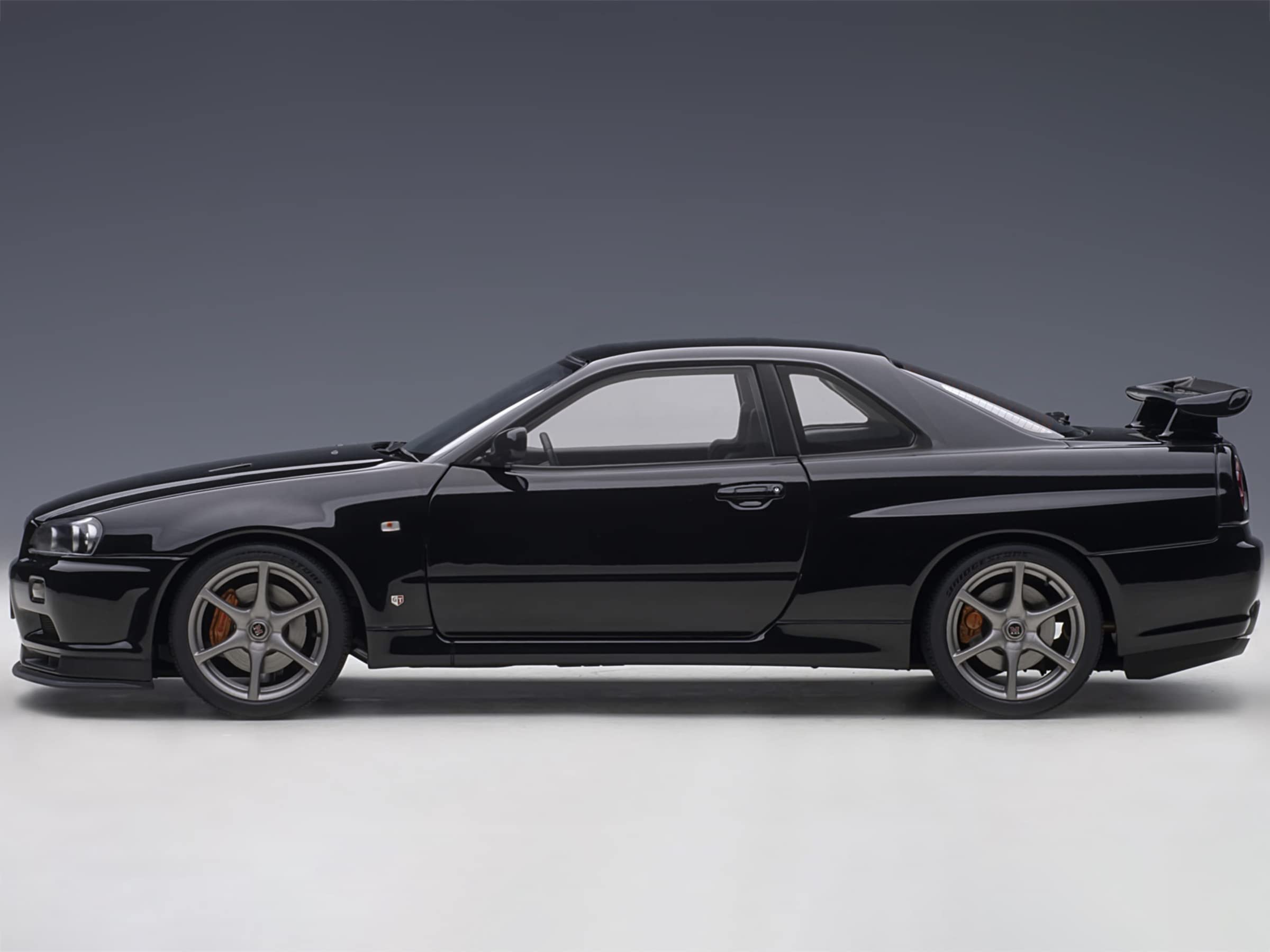 Skyline GT-R (R34) V-Spec II RHD (Right Hand Drive) Black Pearl 1/18 Model Car by Autoart 77407