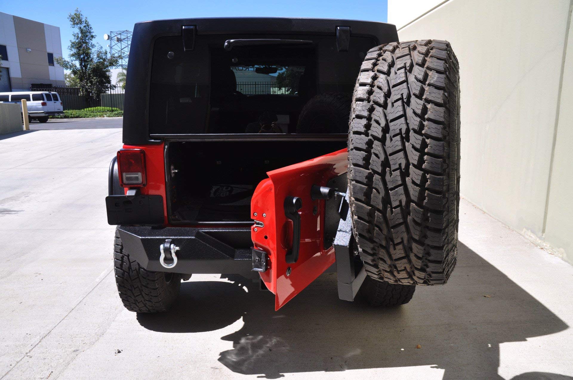 DV8 Offroad Rear Bumper with Swing Away Spare Tire Carrier for Wrangler JK Mid Width Single Opening Action Accommodates up to 37" Tire High Clearance Lightweight Black Finish RBSTTB-02