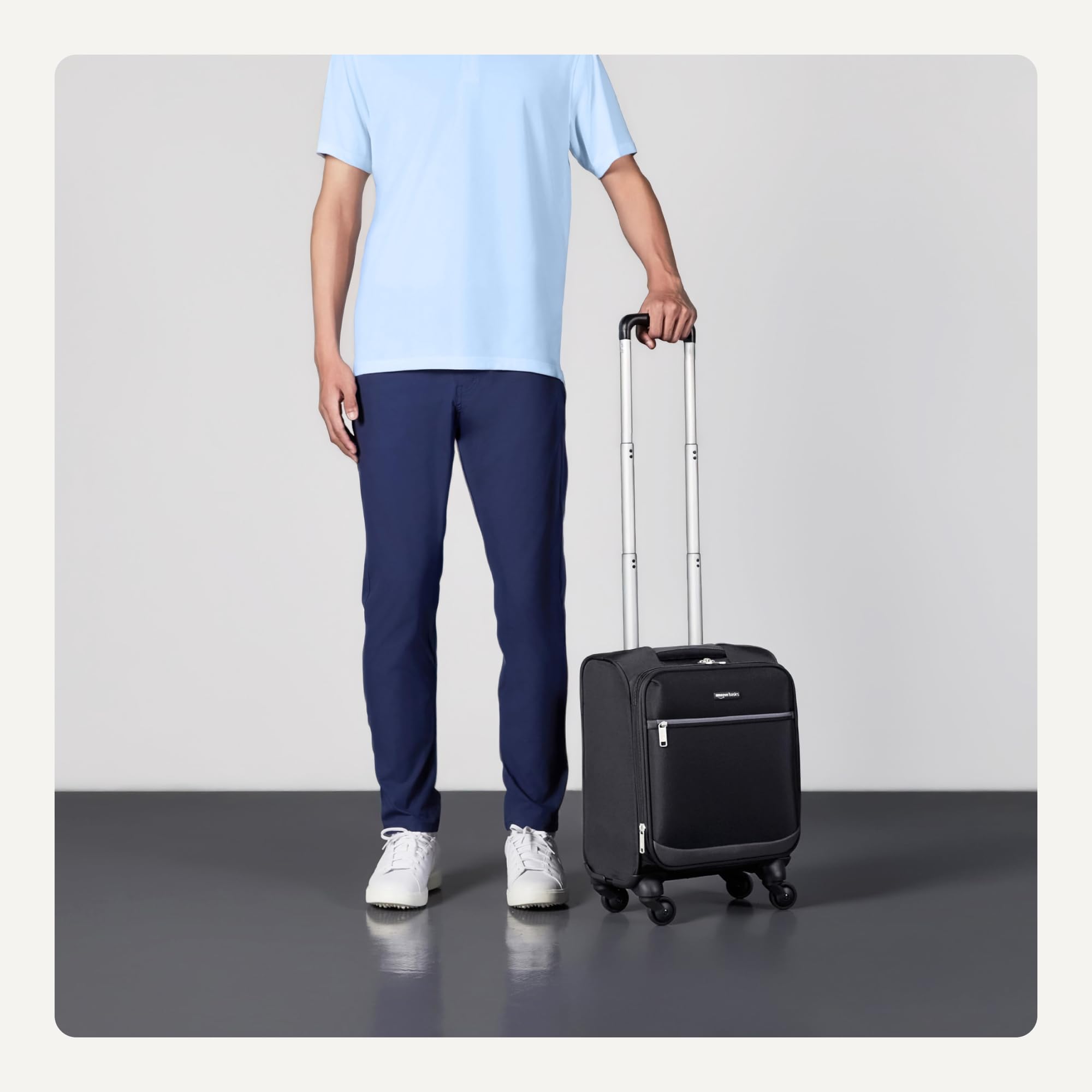 Amazon Basics Luggage, 18" Small Carry-On Softside Suitcase With Wheels, With Four 360-Degree Multi-directional Spinner Wheels, Expandable Space, Zippered Pocket and Straps, Telescopic Handle, Black