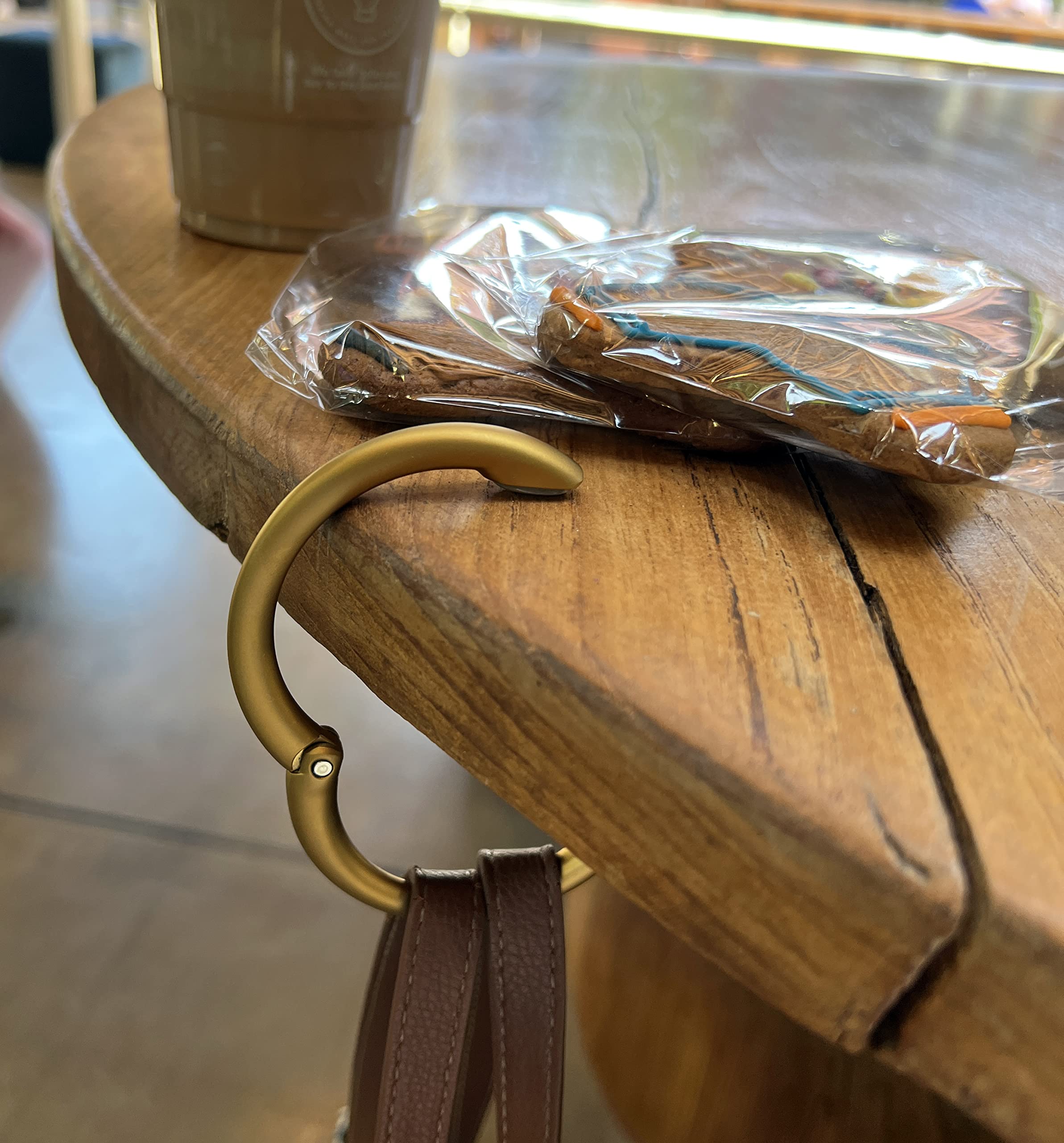 Clipa Bag Hanger β Matte Gold PVD - The Ring That Opens Into a Hook and Hangs in Just 1/2" of Space, Holds 33 lbs., 3 yr. Warranty