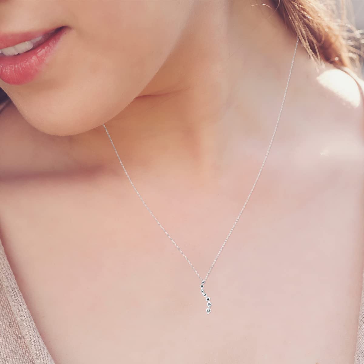 AGS Certified 1/2 Carat TW Diamond Journey Pendant in 10K White Gold (K-L Color, I2-I3 Clarity)