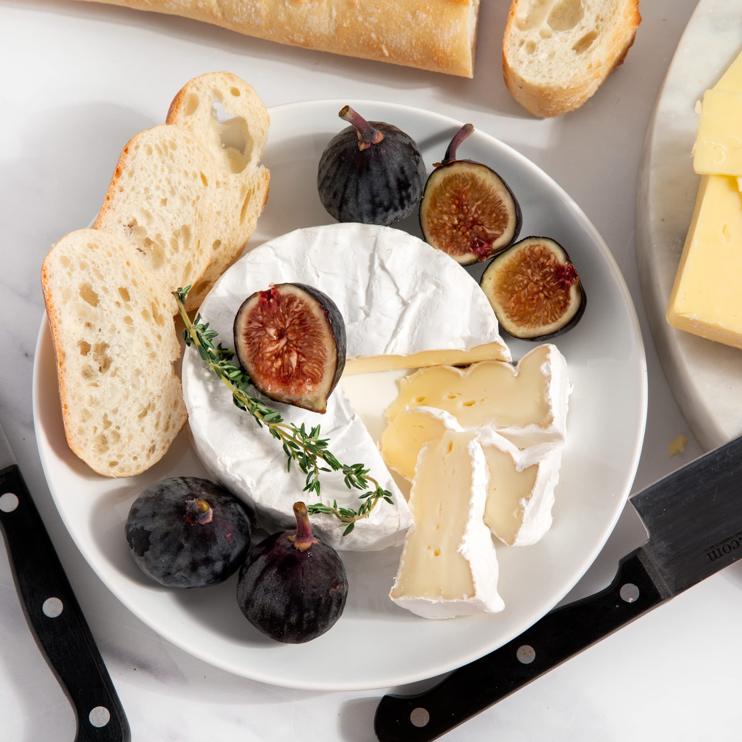 igourmet Cheese Sampler - Our Royal 8-Cheese Assortment contains Blue Cheese, Goat Cheese, Nutty, Smoked, Tangy, Spanish Cheese, Goat Cheese, Creamy, and Swiss