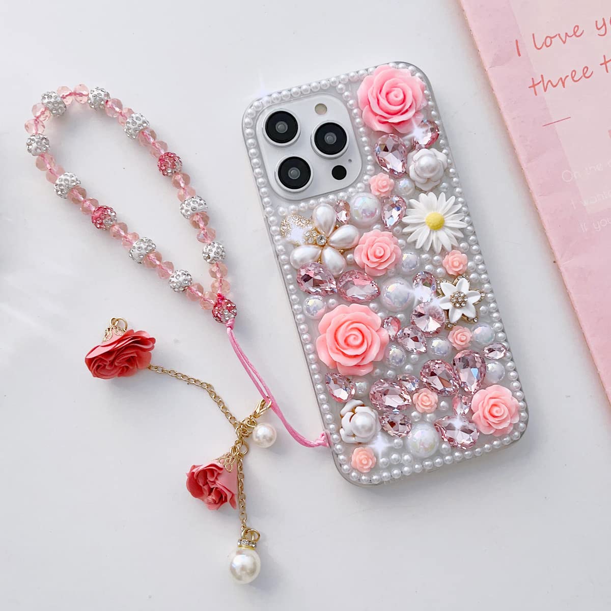Changjia for iPhone 14 Pro Max Glitter Bling Case, Girly Cute Luxury 3D Crystal Rhinestone Flowers Diamond Pearl with Lanyard Wrist Strap Women Girls Case Cover for iPhone 14 Pro Max 6.7 inch (Pink)