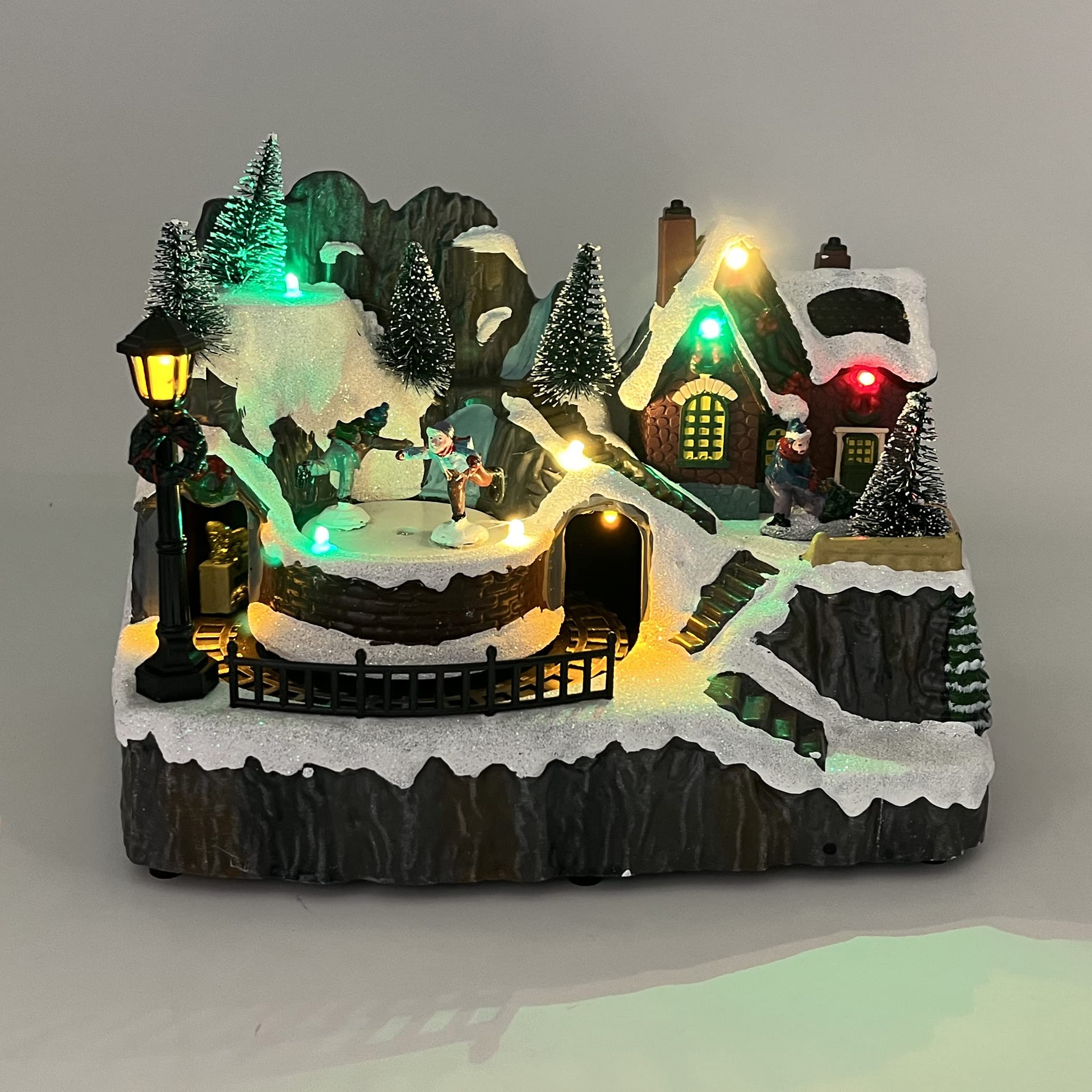 allgala Crafted Polyresin Christmas House Collectable Figurine with USB and Battery Dual Power Source-Moving Train and Skaters-XH93445