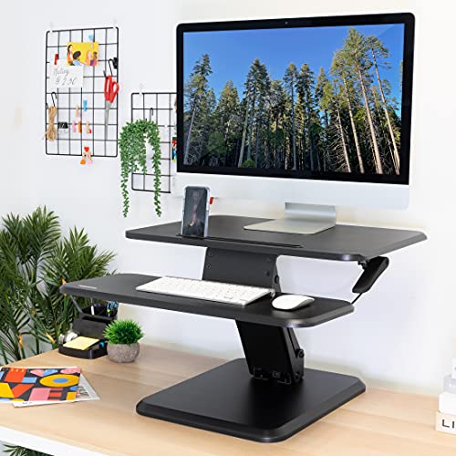 Mount-It! Height Adjustable Standing Desk Converter, 25β Wide Desktop - Sit-Stand Converting Desks with Gas Spring for Home, Office - Stand-Up Computer Workstation Desktops