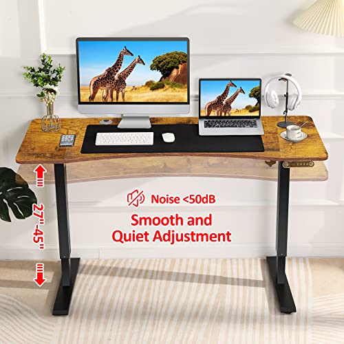 55 x 24 Inch Electric Standing Desk Adjustable Height, Sit-Stand Desk with Oversized Mouse Pad, Ergonomic Curved Desktop, Double Crossbeam Structure, 27''-45'' Lifting Range Stand up Desk(Brown)