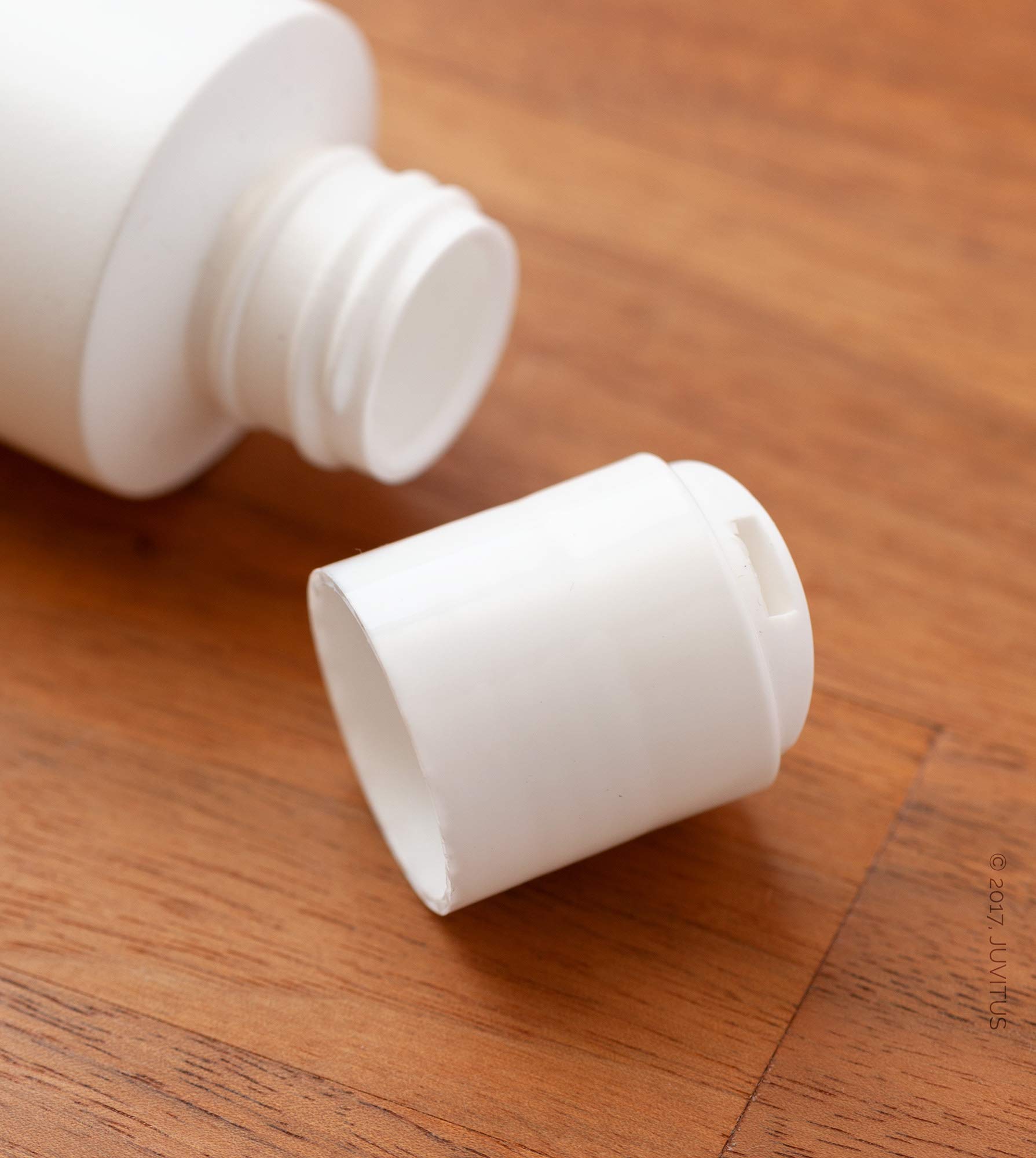 JUVITUS 4 oz / 120 ml White Plastic HDPE Refillable Cylinder Squeeze Bottle with White Disc Cap (12 Pack)