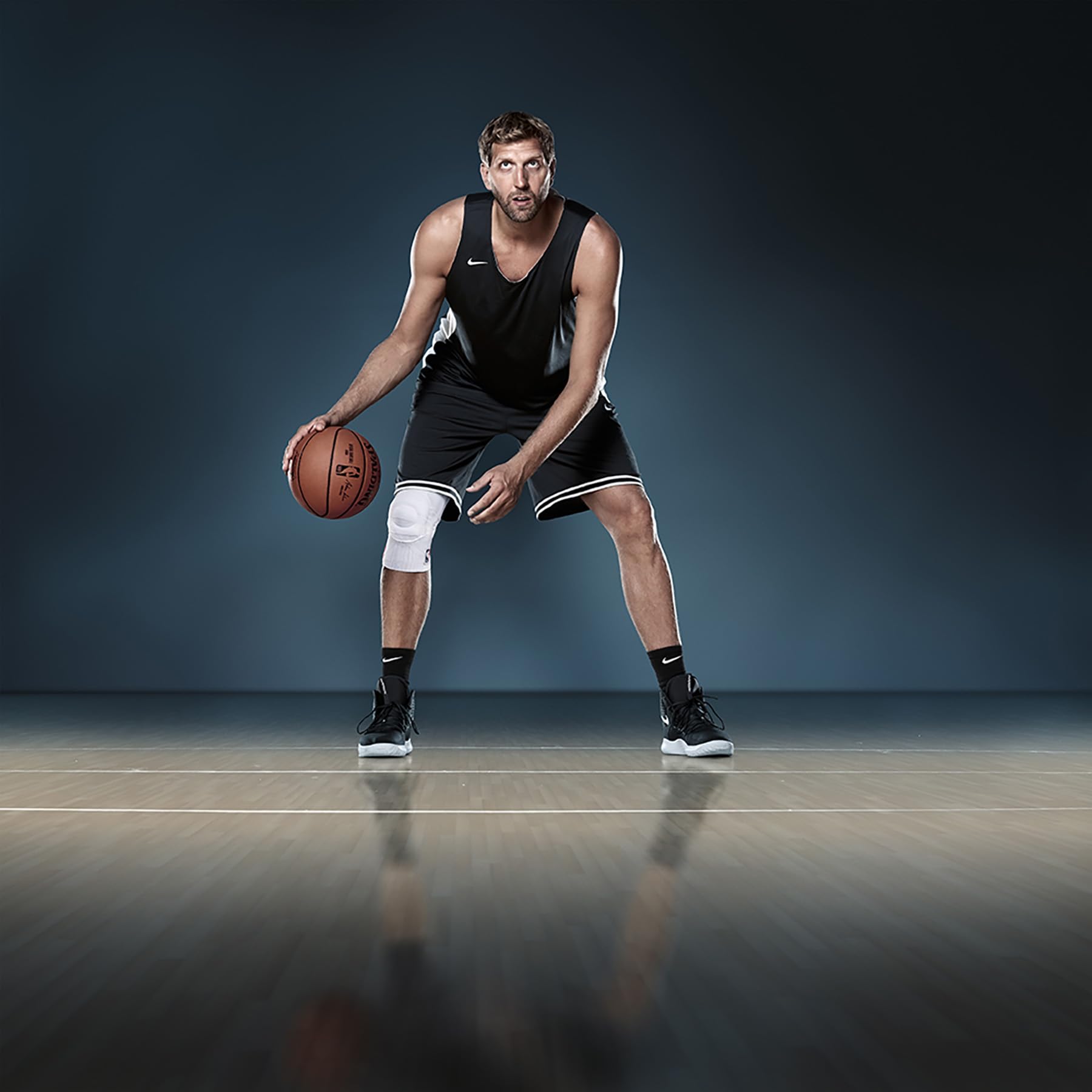 Bauerfeind Sports Knee Support NBA - Officially Licensed Basketball Brace with Medical Compression - Sleeve Design with Omega Gel Pad for Pain Relief & Stabilization (Black, XXL)