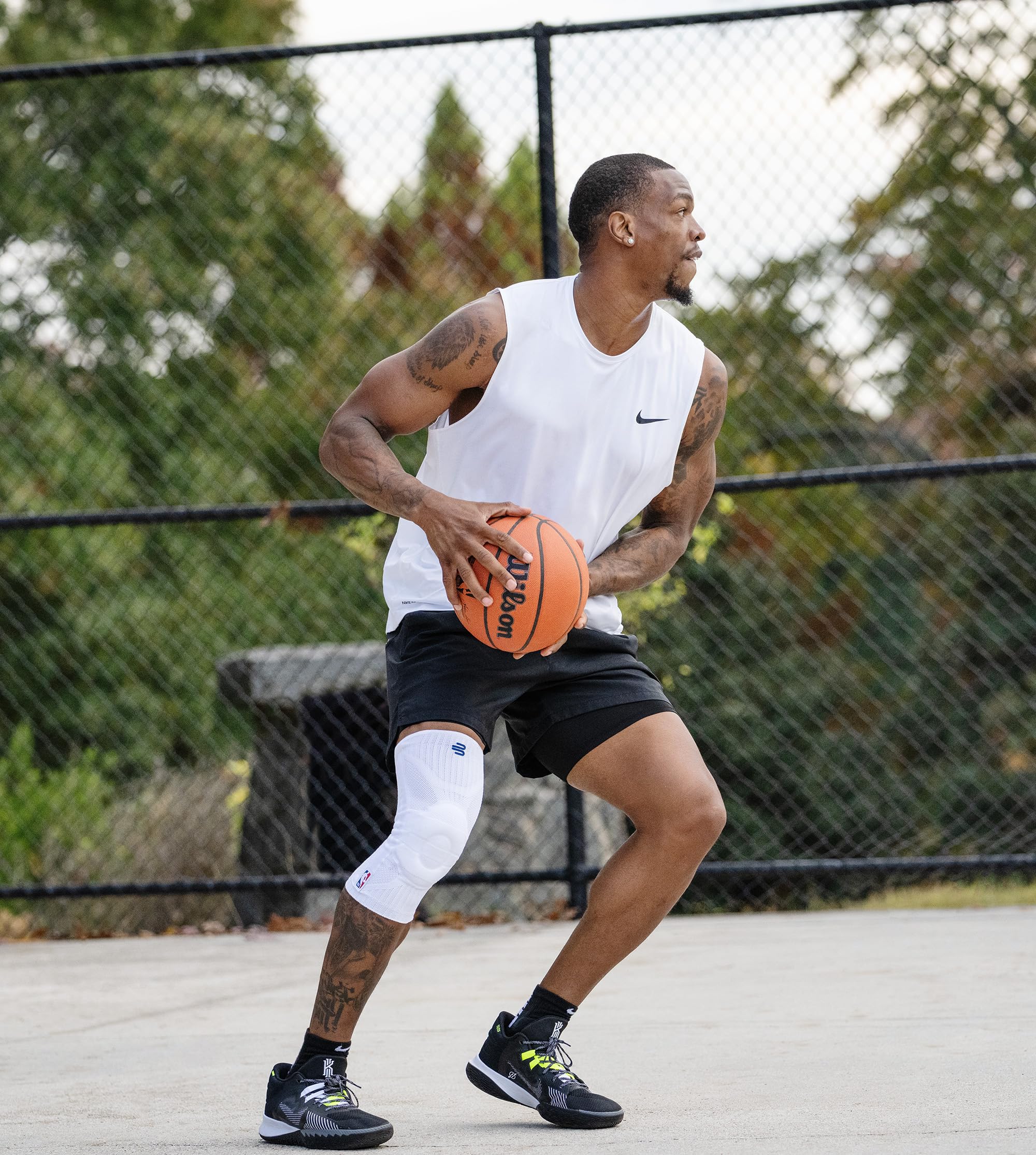 Bauerfeind Sports Knee Support NBA - Officially Licensed Basketball Brace with Medical Compression - Sleeve Design with Omega Gel Pad for Pain Relief & Stabilization (Black, XXL)