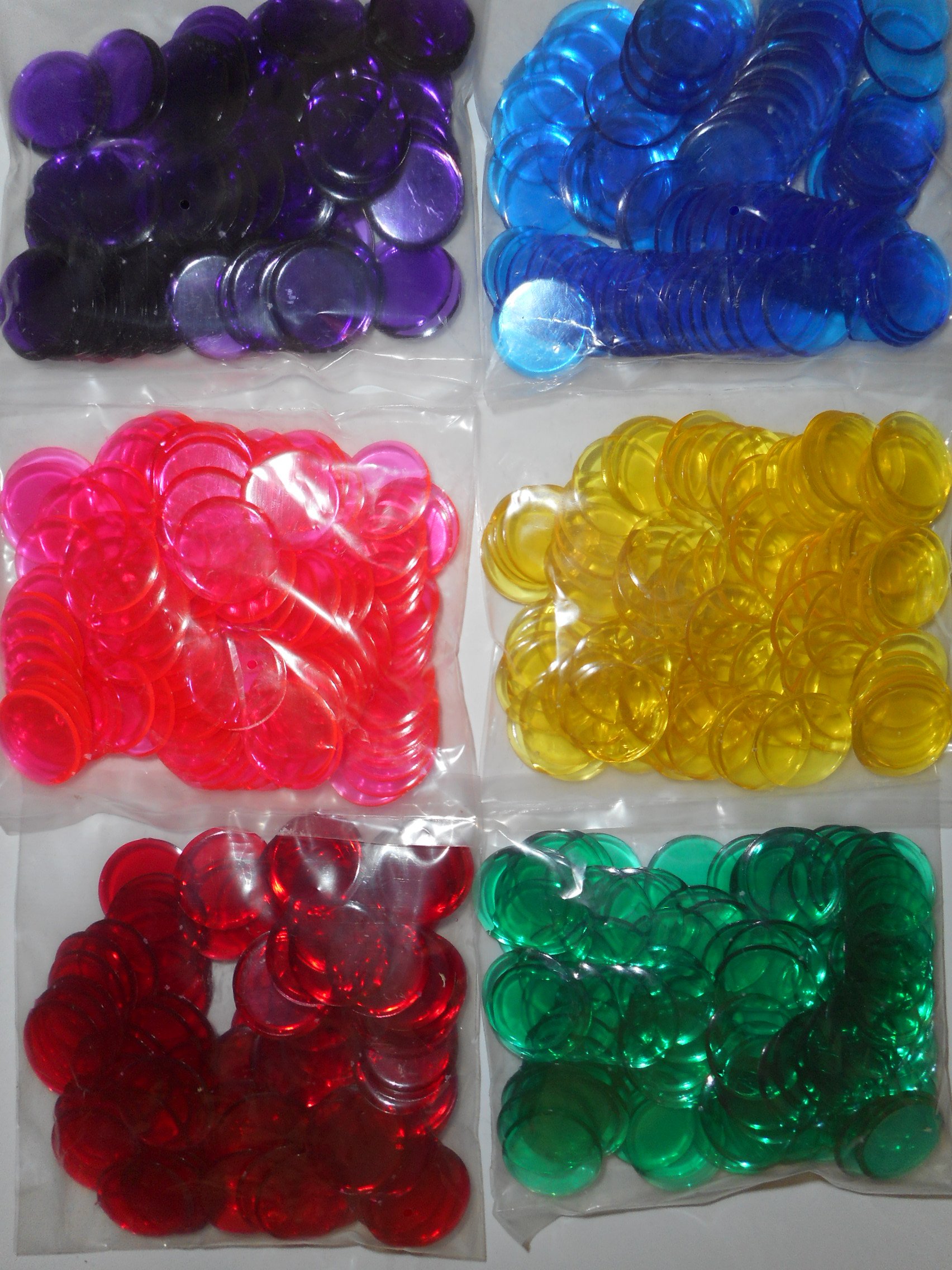 600 Plastic Bingo Chips 100 of Each Color (Red, Purple,Green, Pink,Yellow and Blue.)