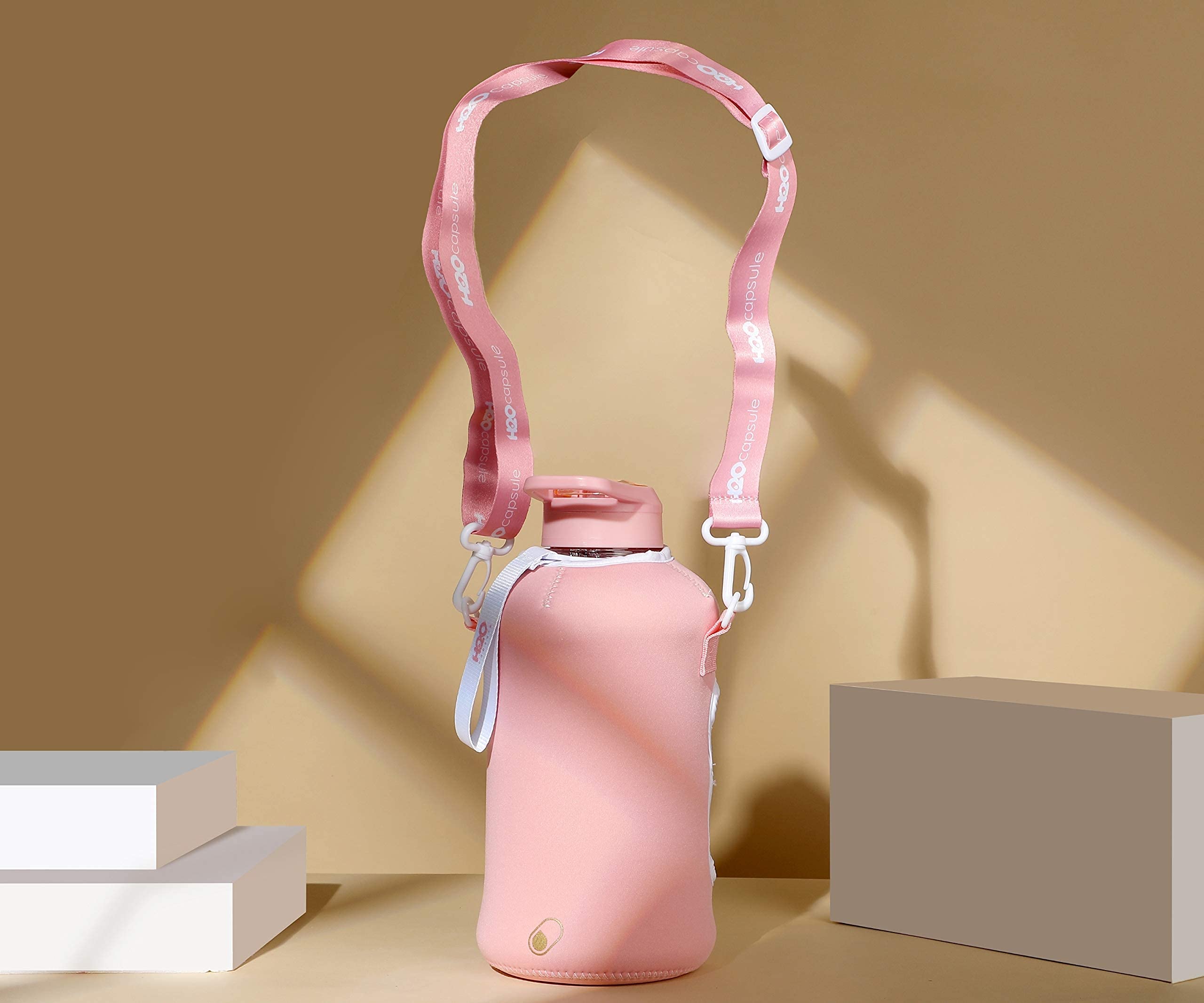 H2O Capsule 2.2L Half Gallon Water Bottle with Storage Sleeve and Covered Straw Lid – BPA Free Large Reusable Drink Container with Handle - Big Sports Jug, 2.2 Liter (74 Ounce) Rose Quartz