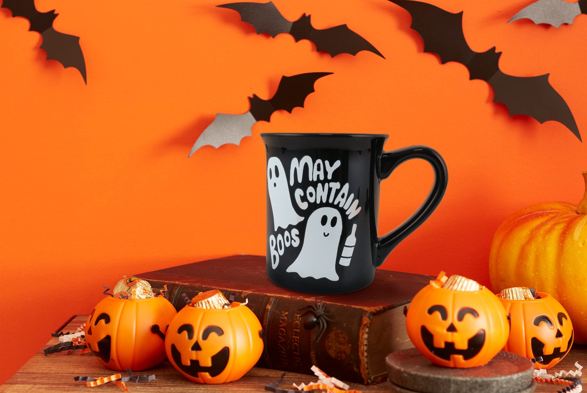 Enesco Our Name is Mud Halloween Ghost May Contain Boos Glow in The Dark Coffee Mug, 16 Ounce, Black and White
