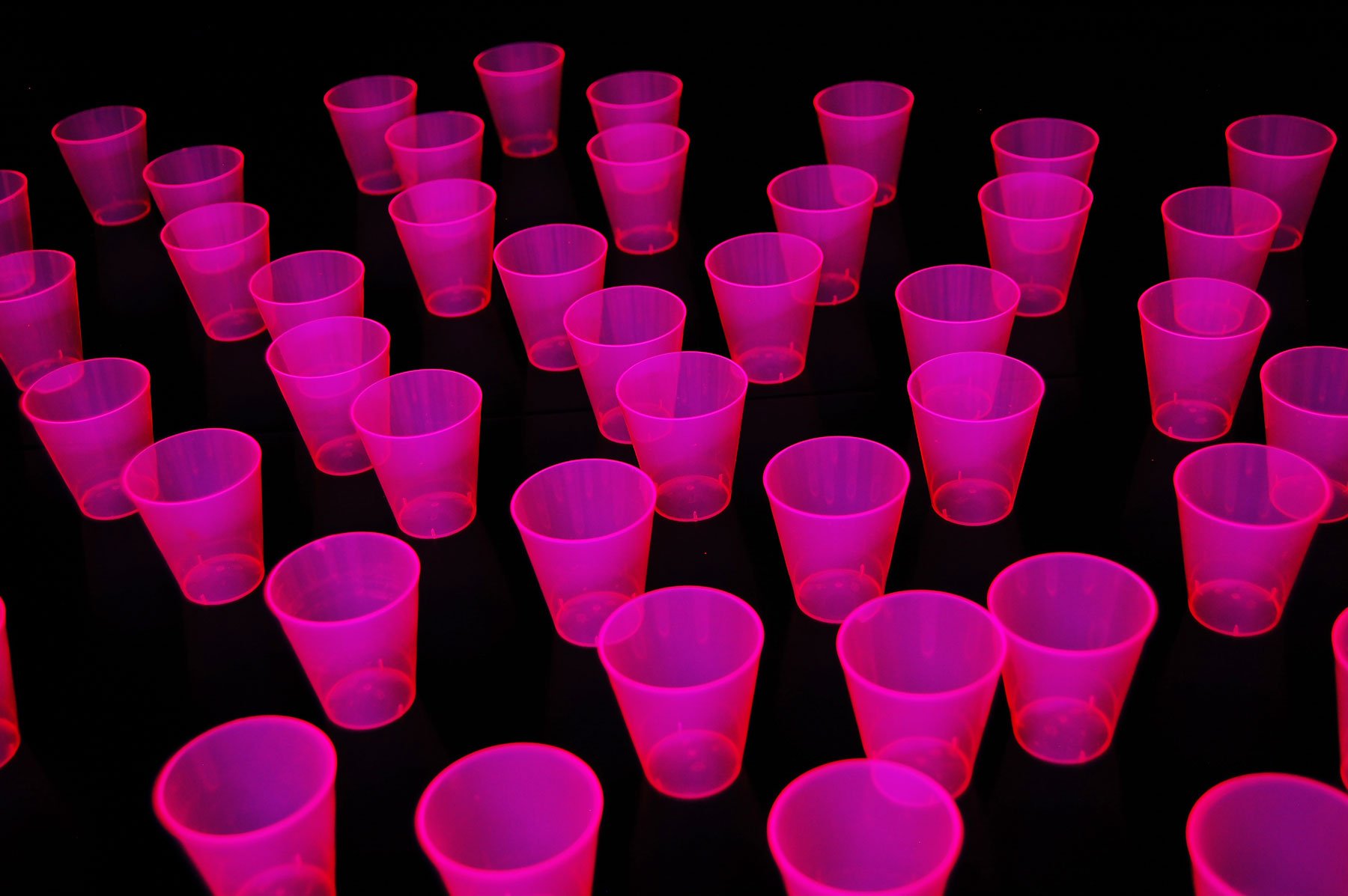 DirectGlow 2oz Neon UV Blacklight Reactive Glow Party Shot Glasses (50-Count, Pink)