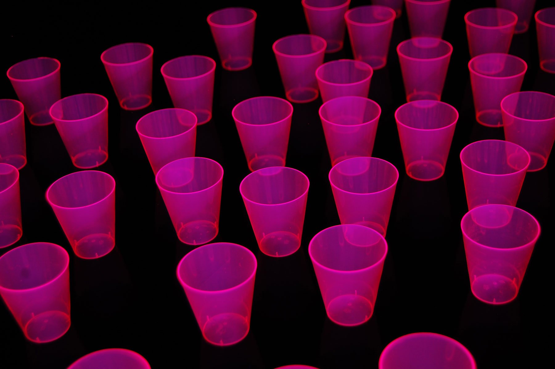 DirectGlow 2oz Neon UV Blacklight Reactive Glow Party Shot Glasses (50-Count, Pink)