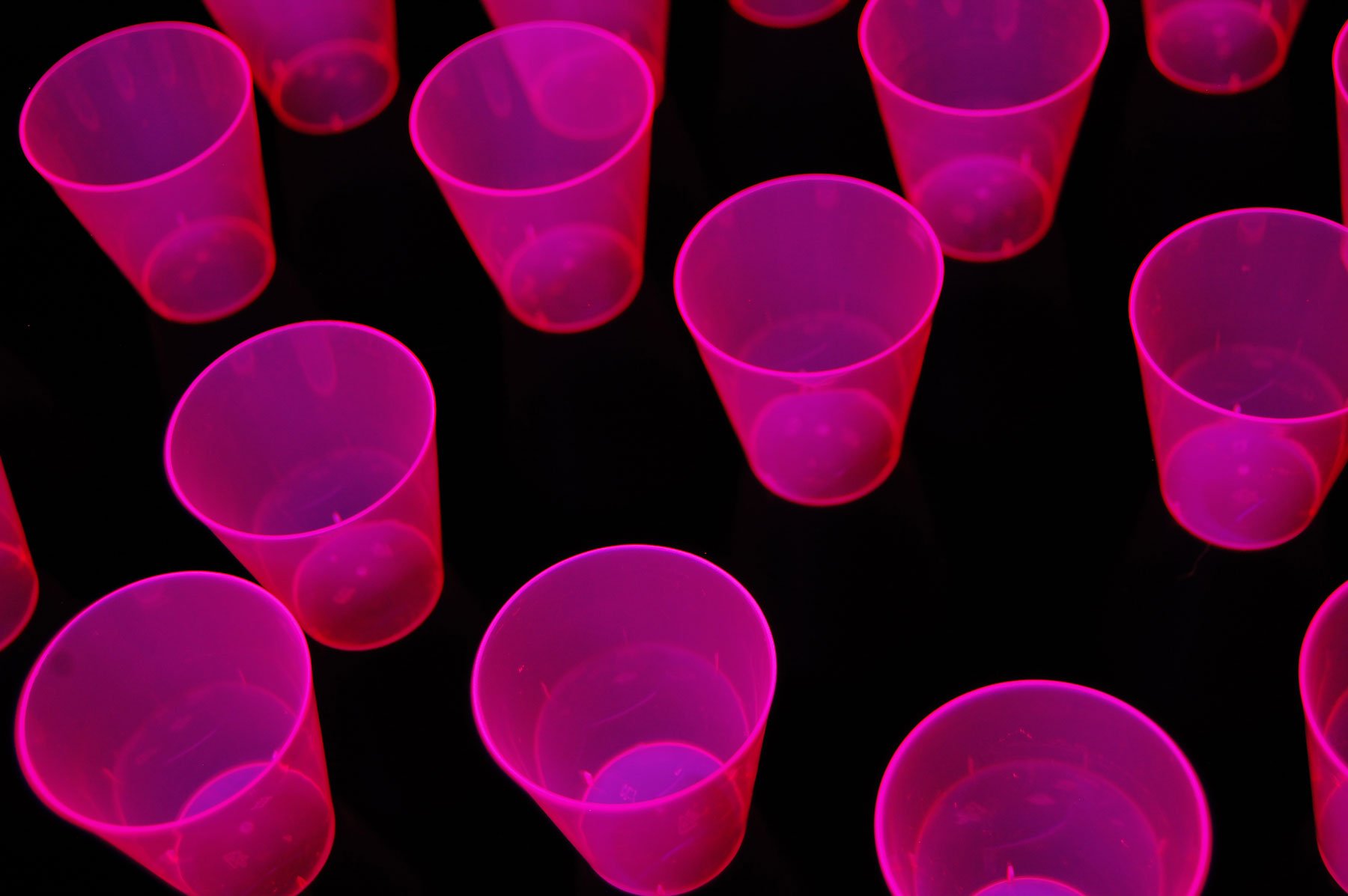 DirectGlow 2oz Neon UV Blacklight Reactive Glow Party Shot Glasses (50-Count, Pink)