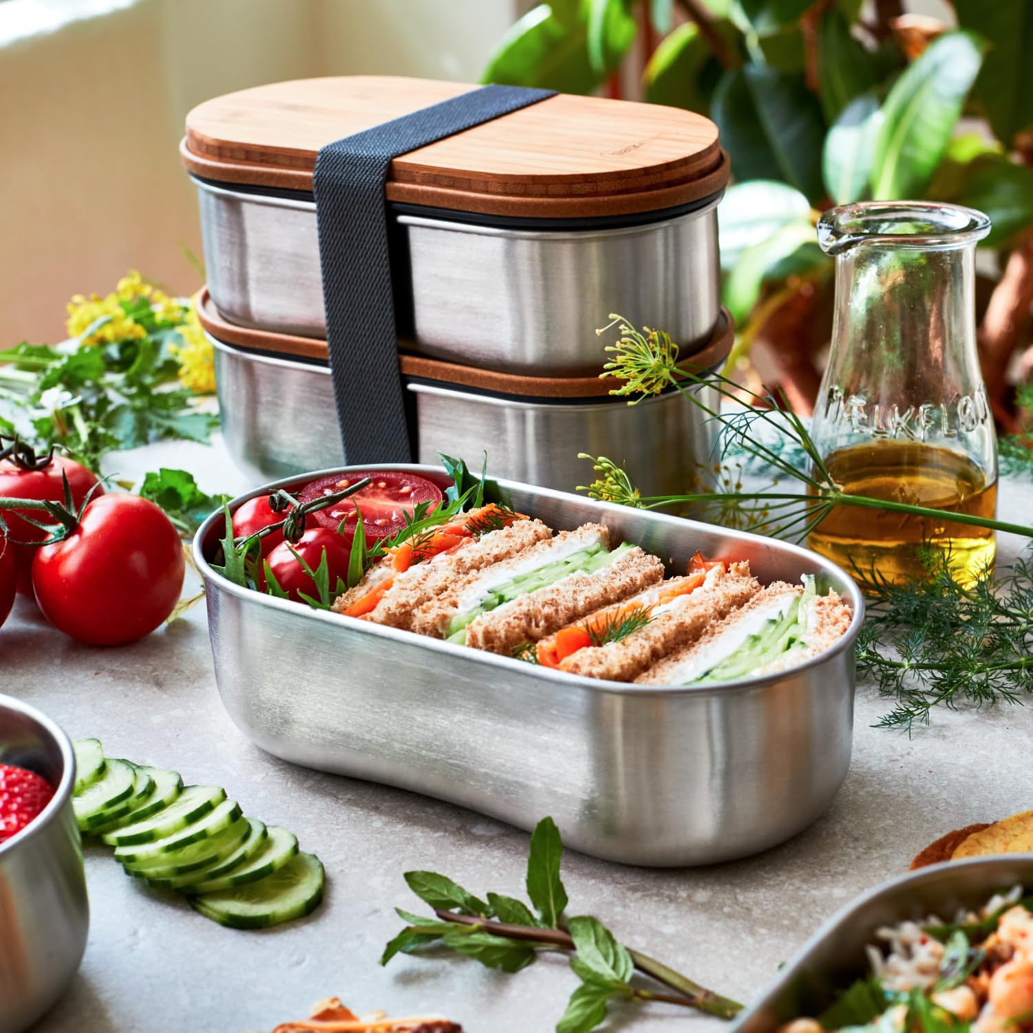 BLACK + BLUM Stainless Steel Bento Box | Plastic Free, Leak-Proof, 2-Compartment Lunch Box with Travel Fork and Bamboo Chopping Board Lid for Packing Healthy and Delicious Food | 34 oz / 1000 ml