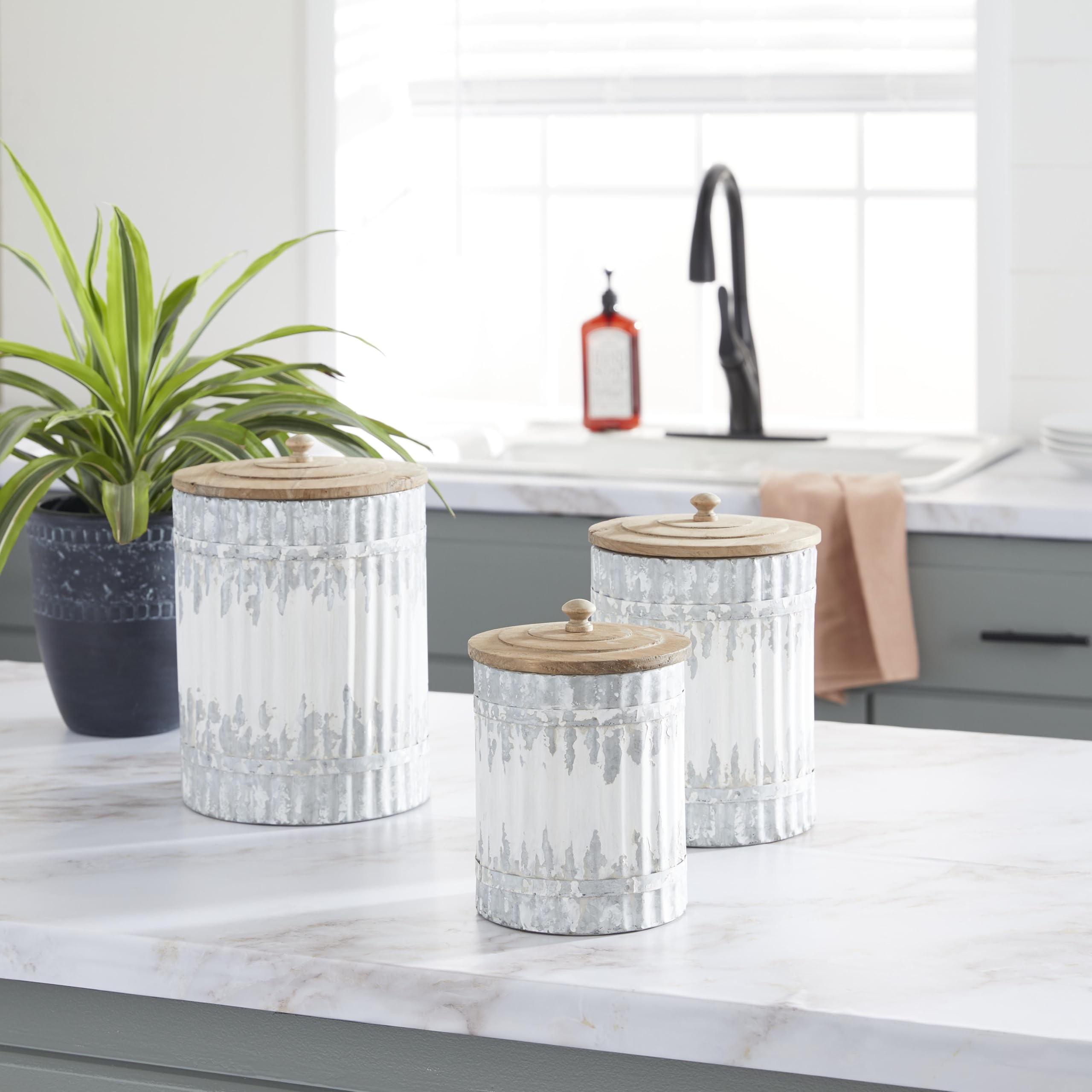 Deco 79 Metal Living Room Decorative Jars Distressed Decorative Container with Wood Lids, Set of 3 Jar with Lid 12", 10", 8"H, White