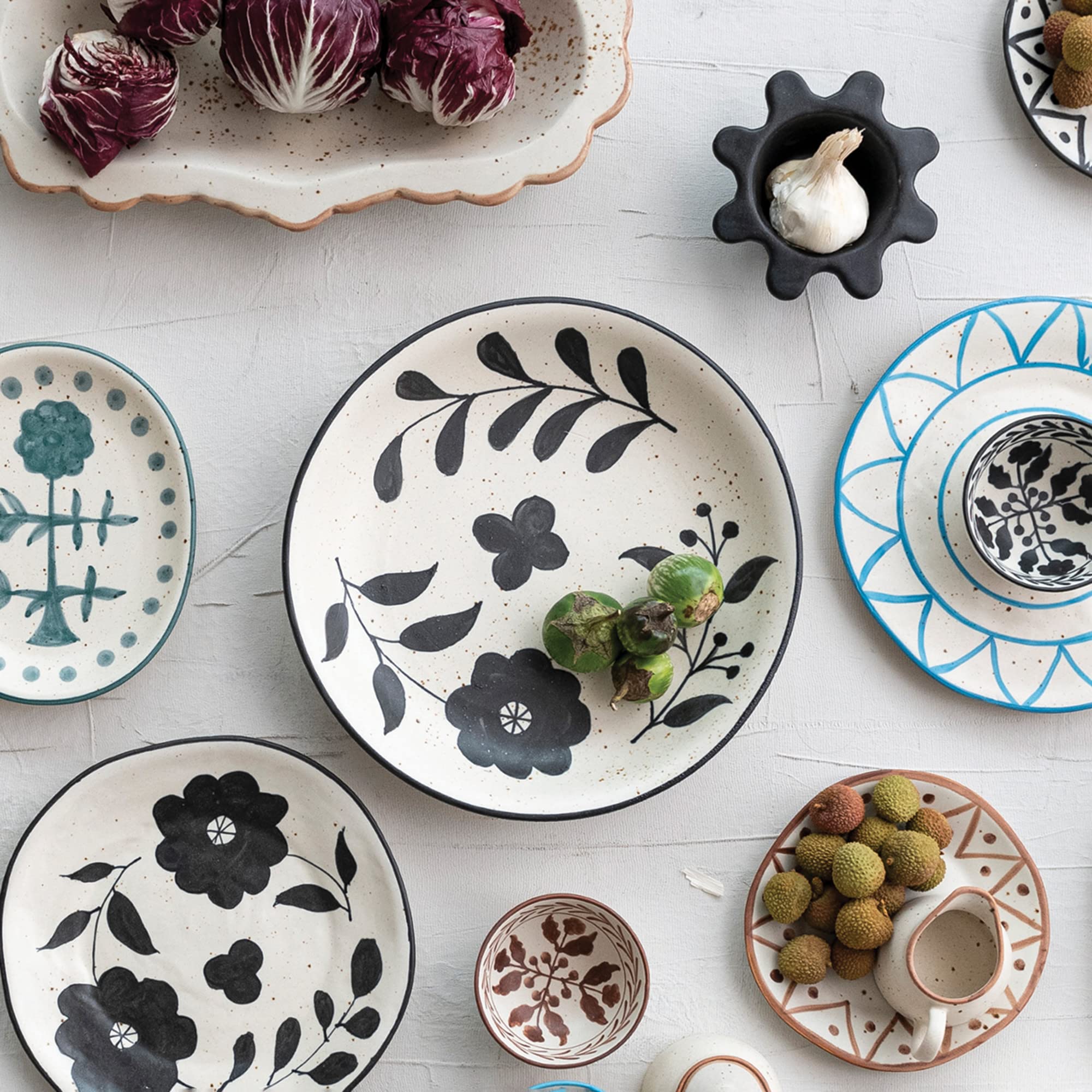Creative Co-Op Hand Painted Stoneware Bowl with Floral Design, Black and White