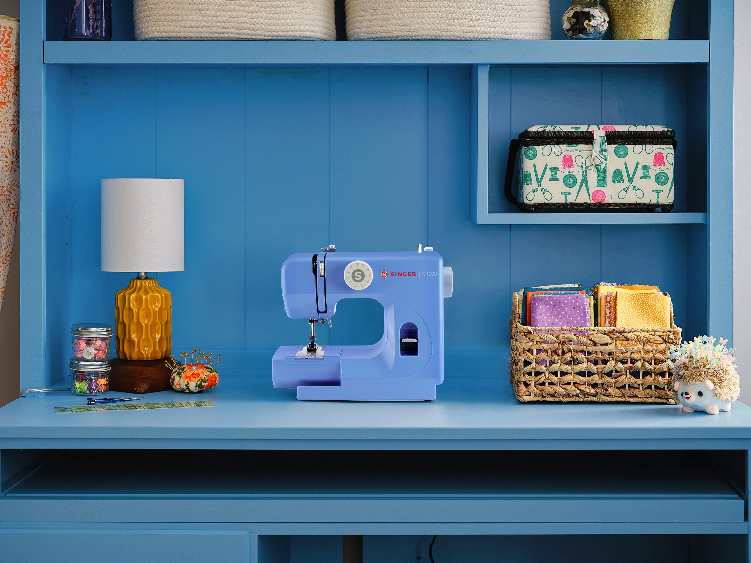 SINGER M1000 Lightweight & Portable Sewing Machine With 32 Stitch Applications, LED Light & Top drop-in bobbin for Hems | Great for Mending - Blue