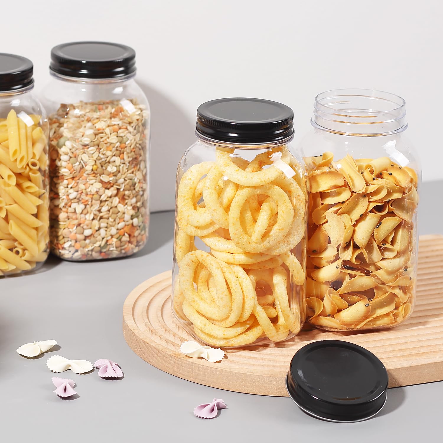 OMNISAFE 32 Ounce Clear Plastic Mason Jars With Screw On Lid, Reusable Empty Jars for Food Storage, Round BPA Free Containers for Sealing, Dry Food, Snacks, Candies, Breakage-proof, (Black - 12 Pack)