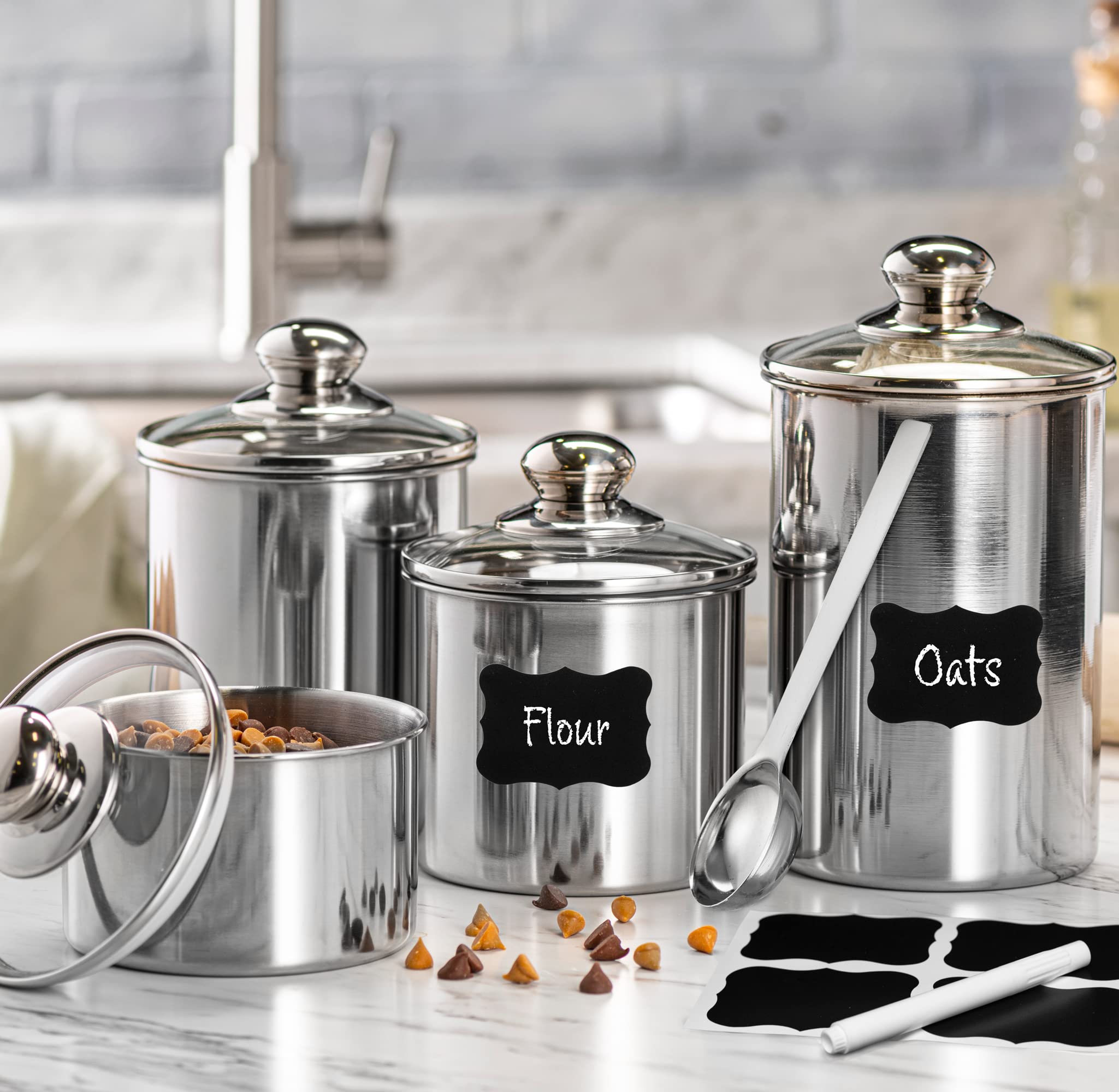 Set of 4 AIRTIGHT STAINLESS STEEL CANISTER SET for Kitchen Counter with GLASS LIDS + MARKER, LABELS, & SCOOP, Kitchen Canisters Ideal for Coffee, Flour, Sugar, Candy, Spices, Food Storage Cookie Jar
