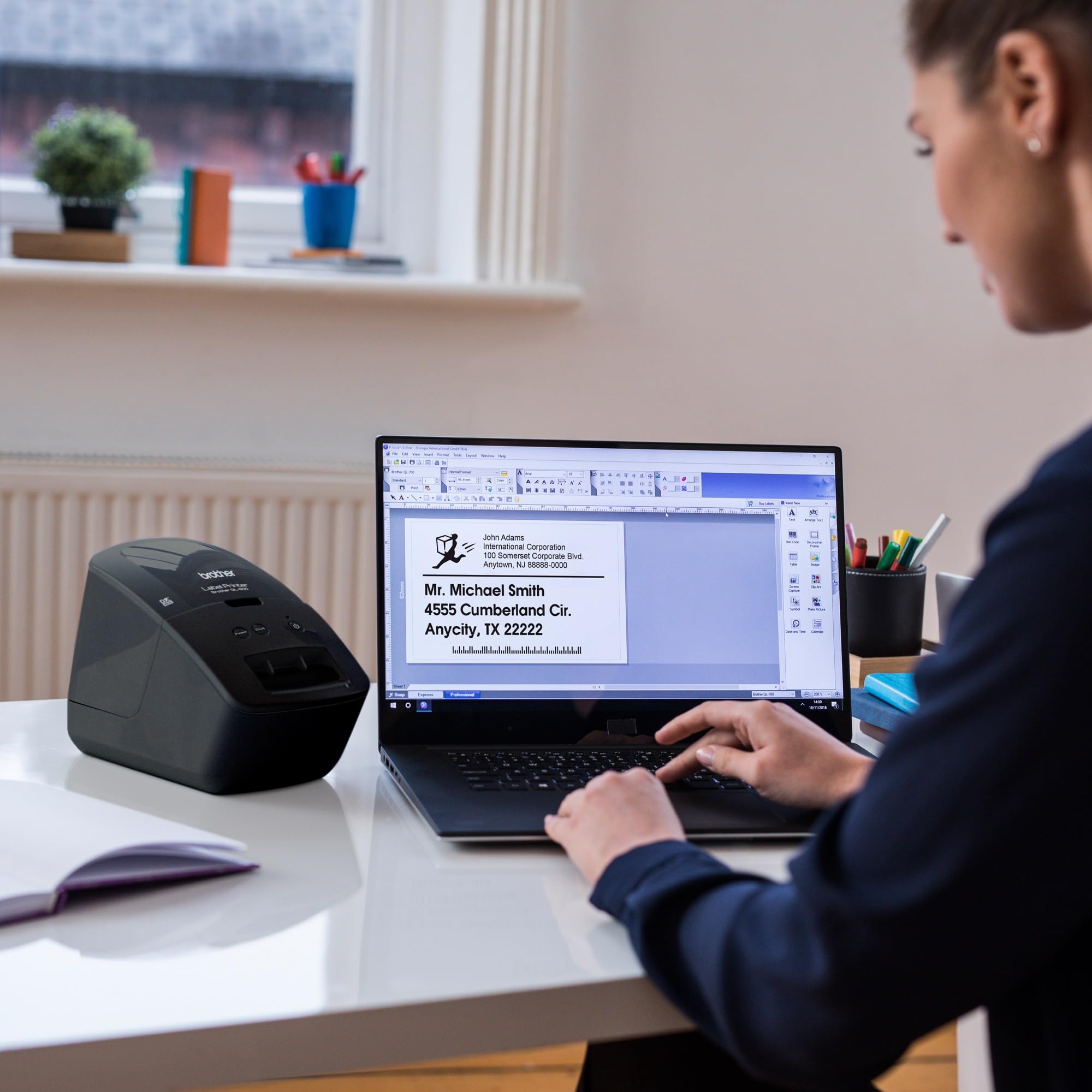 Brother QL-600 Economic Desktop Wired Label Printer, Black - USB Connectivity - up to 2.4" Wide, 300 x 600 dpi, 44 Labels Per Minute, Automatic Cutter Label Maker for Home and Office