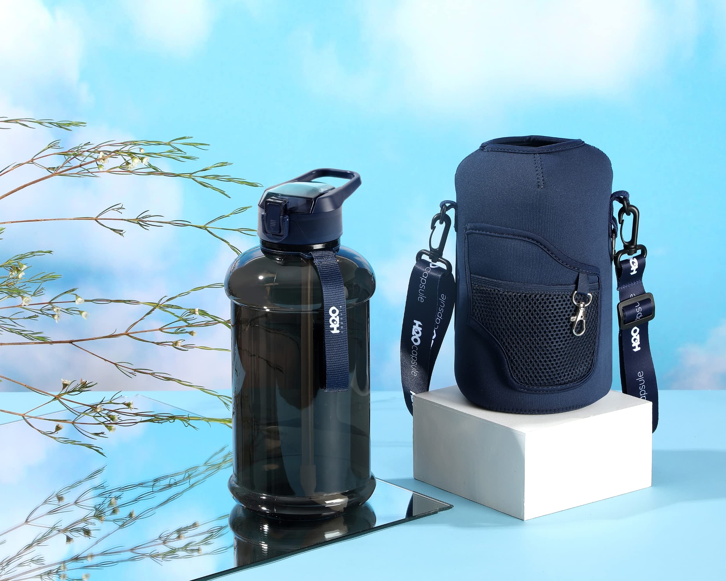 H2O Capsule 2.2L Half Gallon Water Bottle with Storage Sleeve and Removable Straw β BPA Free Large Reusable Drink Container with Handle - Big Sports Jug, 2.2 Liter (74 Ounce), Navy Blue