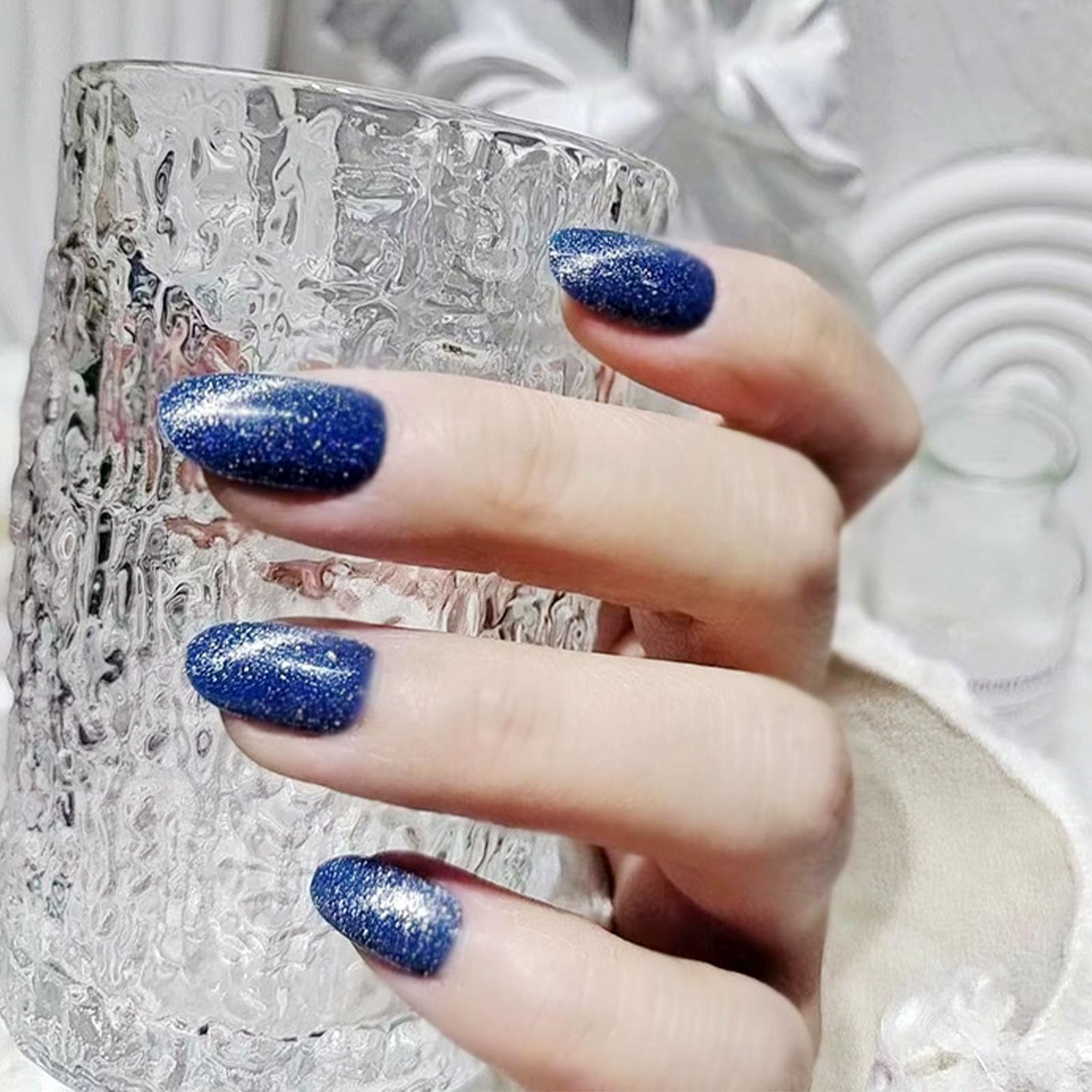 Short Press on Nails Medium Almond Cat Eye Fake Nails False Nails with Glitter Sparkly Designs Blue Full Cover Acrylic Nails Light Luxury and Glossy Artificial Nails for Women 24Pcs