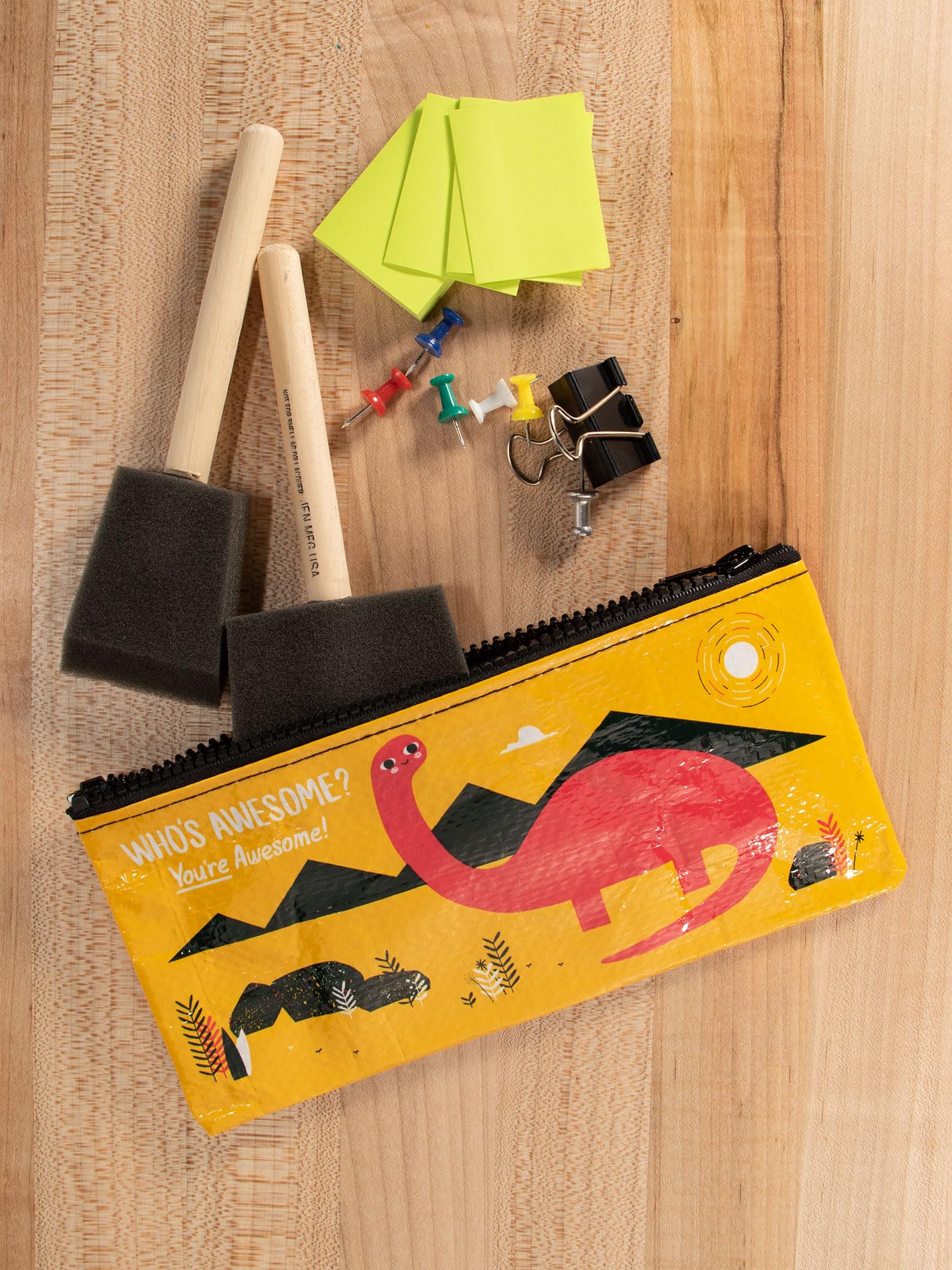 Blue Q Pencil Case ~ Who's Awesome? You're Awesome! (Dinosaur with Dimples). Hefty Zipper, Easy-to-Rinse-Clean, 95% Recycled Material. Store Makeup, Chargers, Coupons, Pencils. 4.25"h x 8.5"w