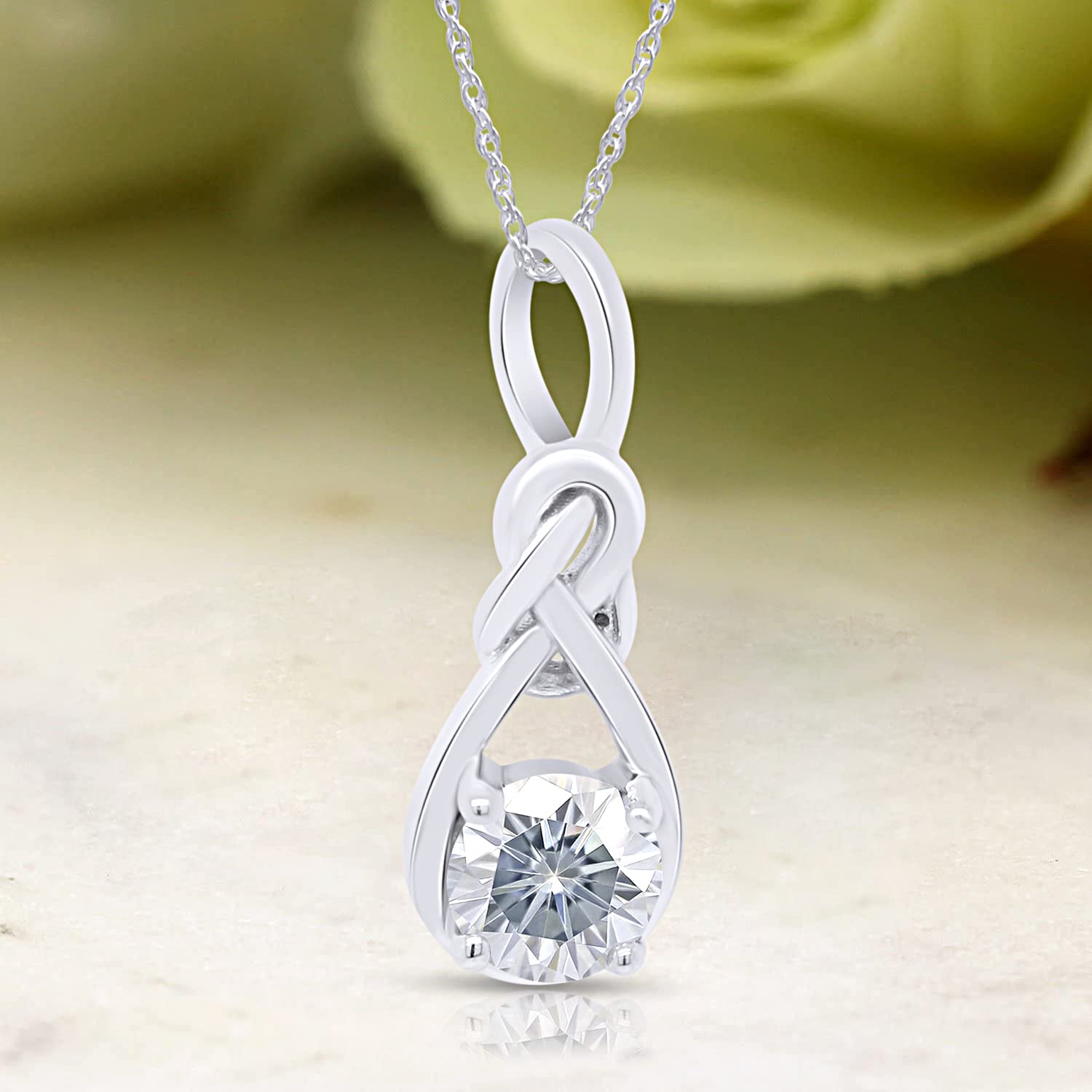 SAVEARTH DIAMONDS 1/2 Carat Round Cut Lab Created Moissanite Diamond Love Knot Solitaire Pendant Necklace In 14k White Gold Over Sterling Silver With 18" Chain (VVS1 Clarity, 0.50 Cttw)