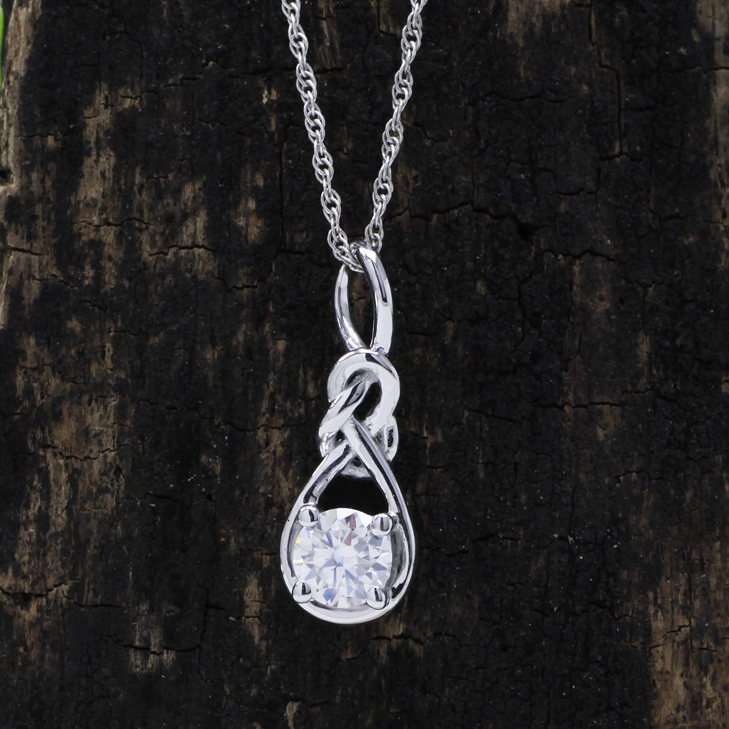 SAVEARTH DIAMONDS 1/2 Carat Round Cut Lab Created Moissanite Diamond Love Knot Solitaire Pendant Necklace In 14k White Gold Over Sterling Silver With 18" Chain (VVS1 Clarity, 0.50 Cttw)