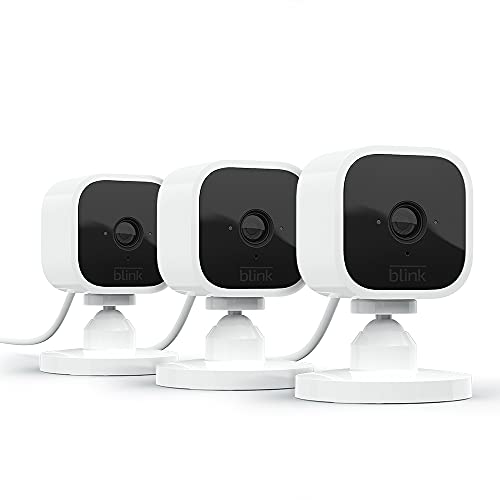 Blink Mini - Compact indoor plug-in smart security camera, 1080p HD video, night vision, motion detection, two-way audio, easy set up, Works with Alexa – 3 cameras (White)