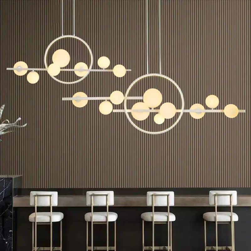 JiuZhuo Minimalist 54.3 Inches 10-Light Glass Globe Shade Sputnik Kitchen Island Light in White,Metal, Glass Shade Linear Pendant Light