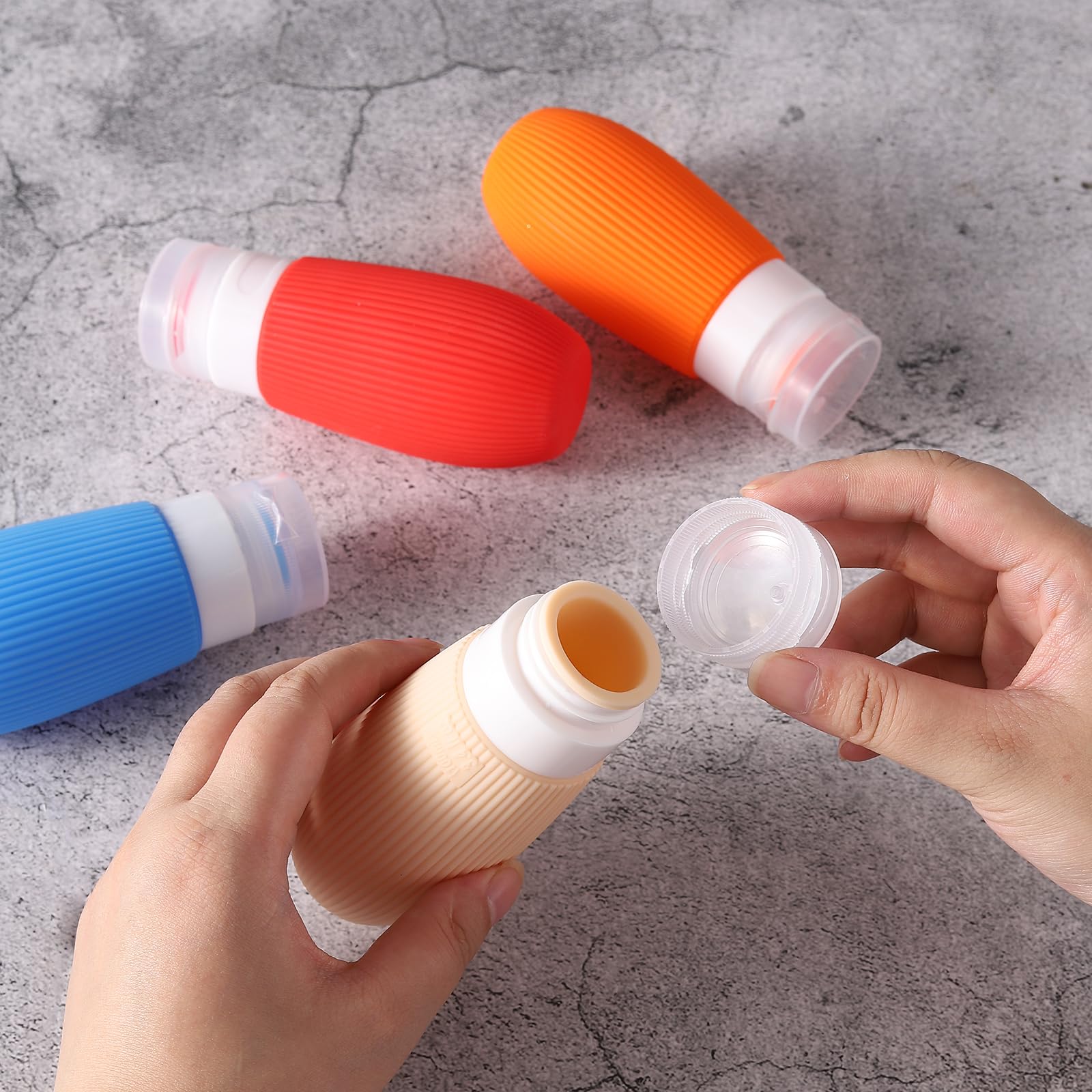 DEPOZA 3.4oz TSA-Approved Squeezable Silicone Travel Bottles - Leak-Proof, BPA-Free Containers for Shampoo, Conditioner, Lotion (4-Pack/Colorful)