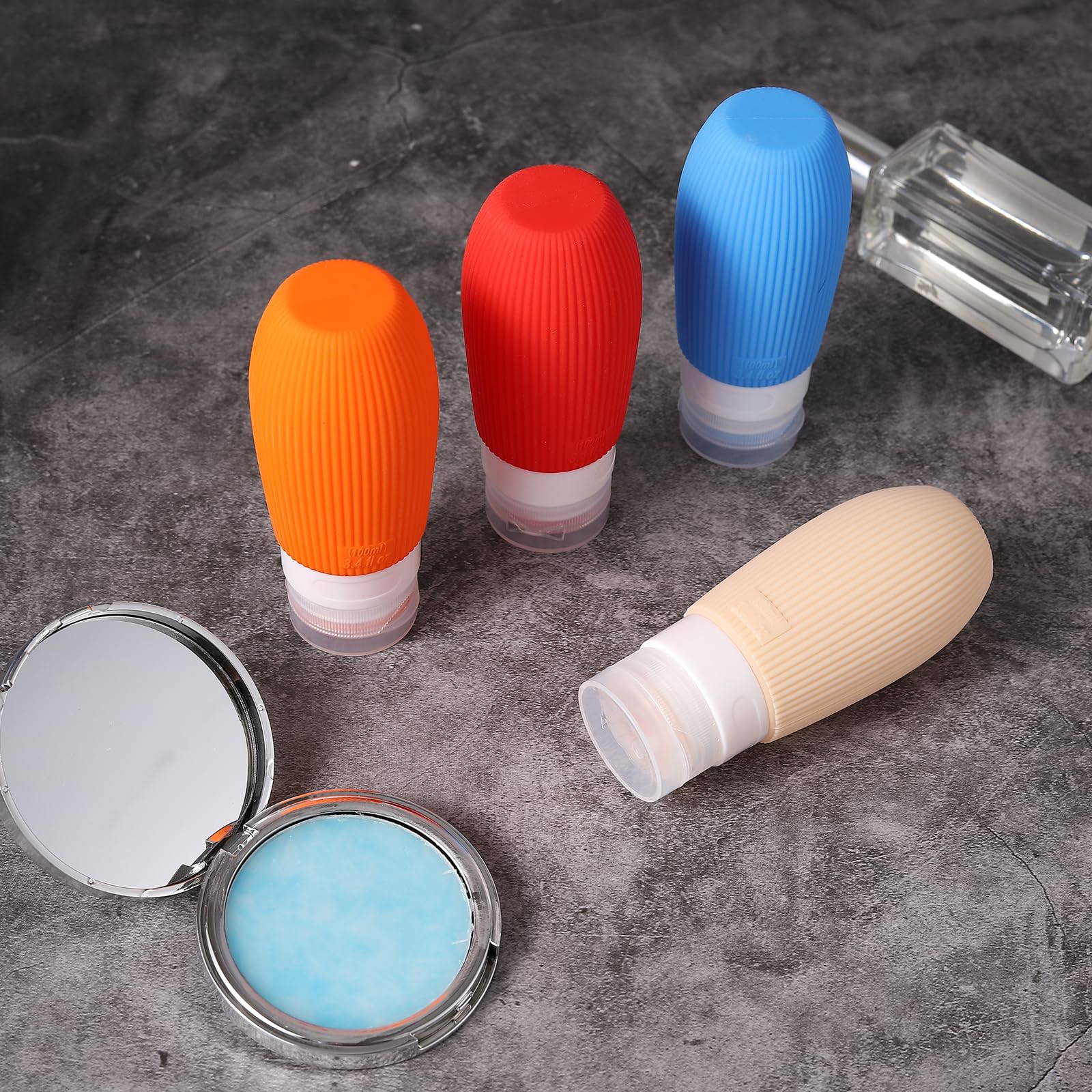 DEPOZA 3.4oz TSA-Approved Squeezable Silicone Travel Bottles - Leak-Proof, BPA-Free Containers for Shampoo, Conditioner, Lotion (4-Pack/Colorful)