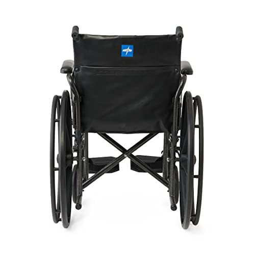 Medline K1 Basic Vinyl Wheelchair with Swing-Back Desk-Length Arms and Swing-Away Footrests, 18-Inch Wide Seat