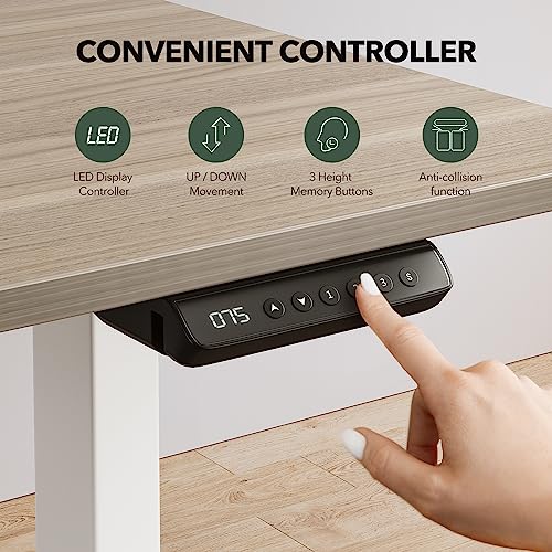FEZIBO 63" L Shaped Standing Desk Height Adjustable, Electric Stand up Corner Desk, Sit Stand Home Office Desk with Splice Board, White Frame/Light Walnut Top