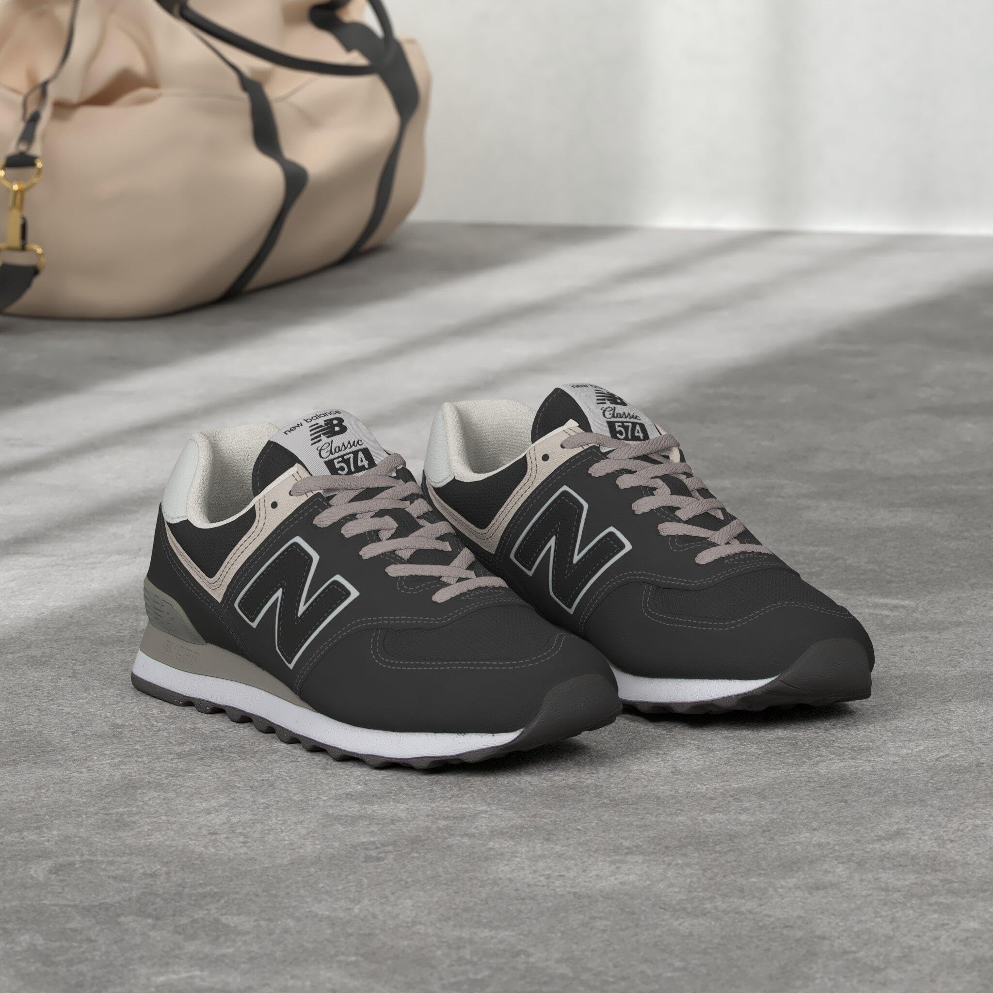 New Balance Women's 574 Core Sneaker, Black/White, 8