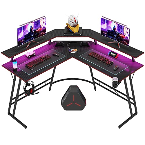 Flamaker Gaming Desk with LED Lights & Power Outlets, L-Shaped Computer Corner Desk with Carbon Fiber Surface & Monitor Stand, Ergonomic Gamer Table with Cup Holder, Headphone Hook, Black
