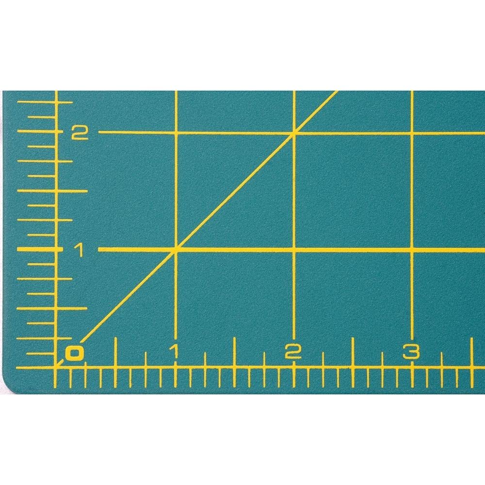 OLFA 18" x 24" Self Healing Rotary Cutting Mat (RM-SG) - Double Sided 18x24 Inch Cutting Mat with Grid for Quilting, Sewing, Fabric, & Crafts, Designed for Use with Rotary Cutters (Green)