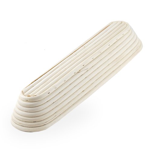 The Lucky Clover Trading Artisan Collection Slim Proofing Basket, 15" x 3.75" x 2.5" at top Rim. Base Dimensions are 13" Long by 2" Wide, Natural Rattan