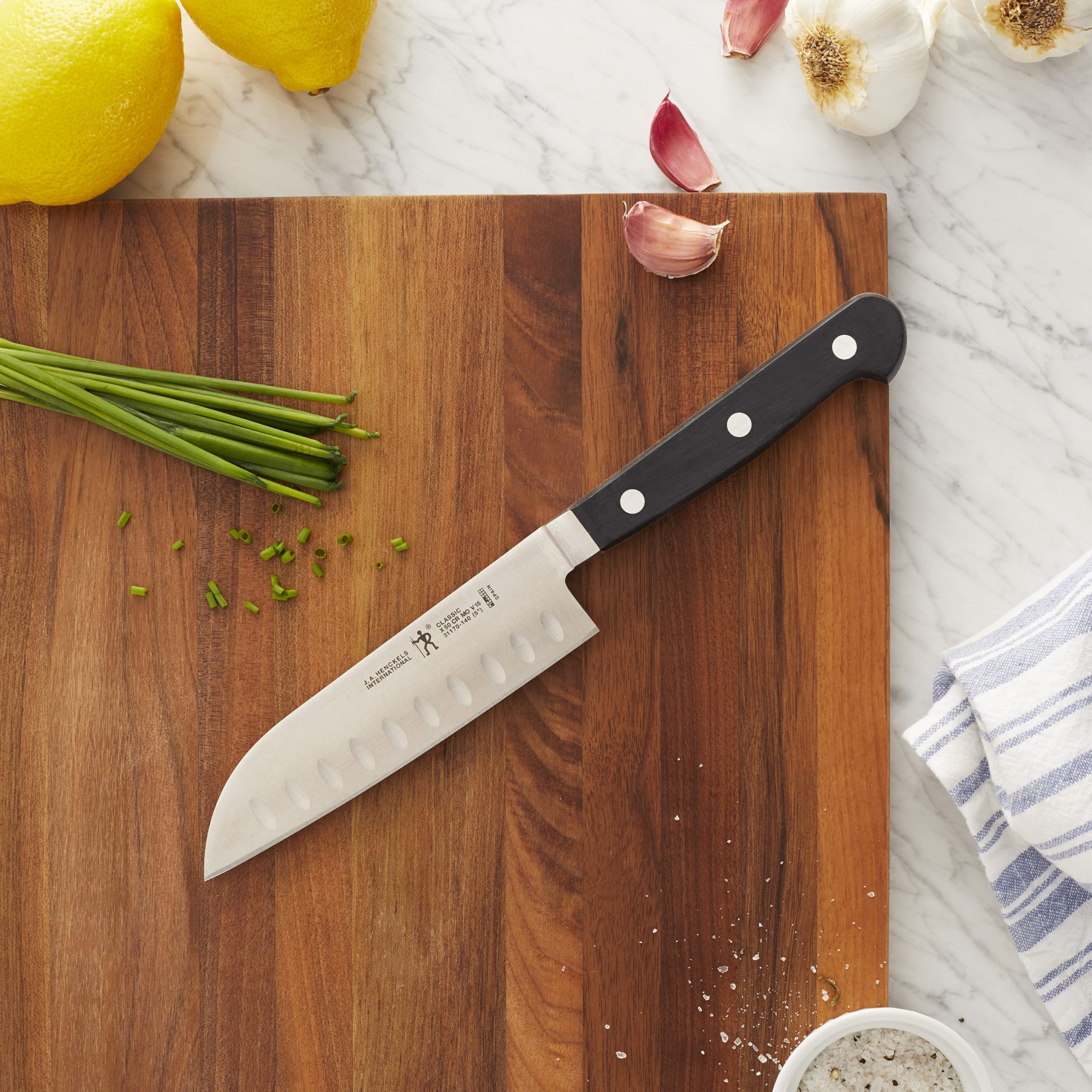 HENCKELS Classic Razor-Sharp 5-inch Hollow Edge Santoku Knife, German Engineered Informed by 100+ Years of Mastery